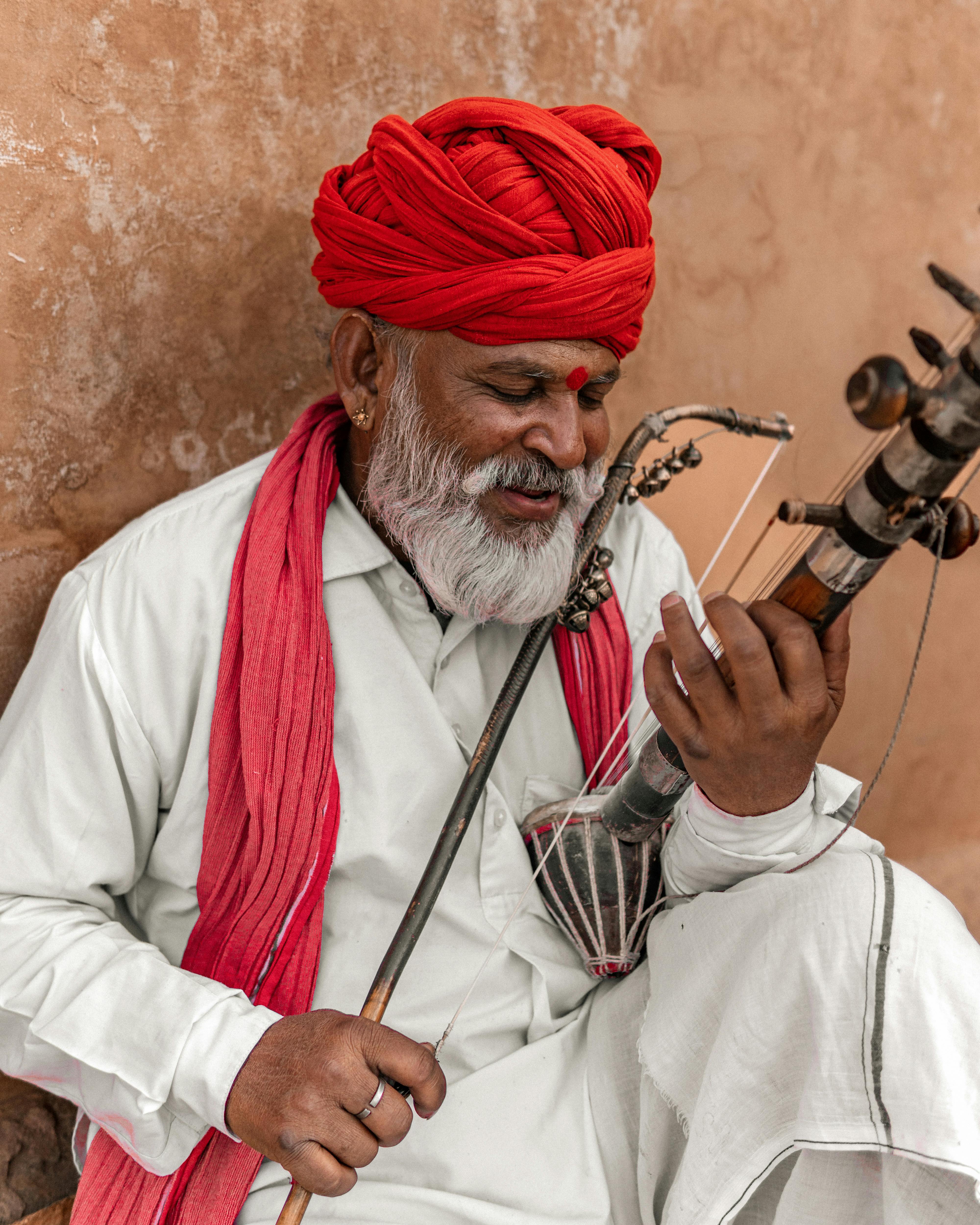 Man Playing Ravanhatta · Free Stock Photo