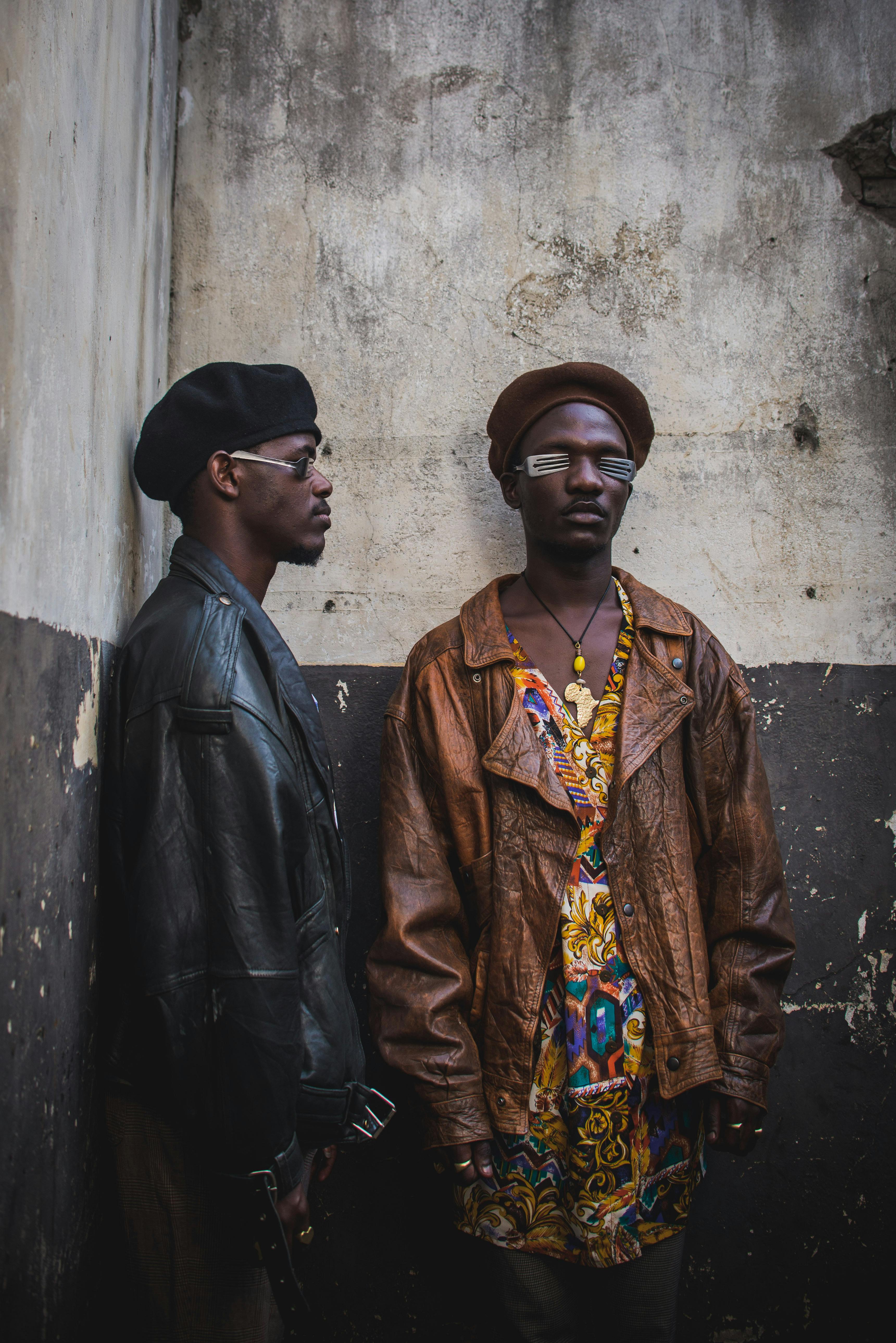 Two men in leather jackets standing next to each other · Free Stock Photo