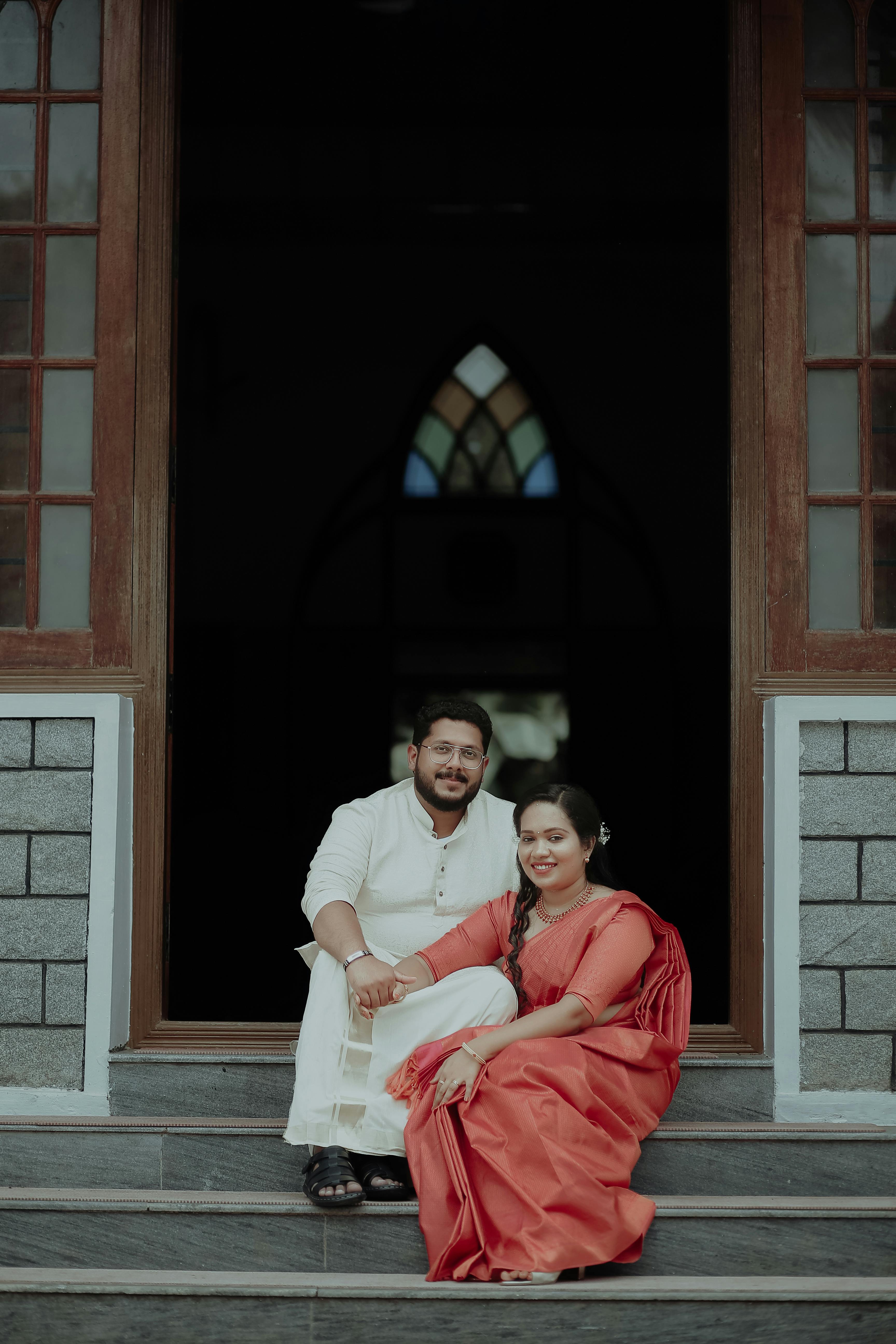 Couple on Steps of Temple · Free Stock Photo