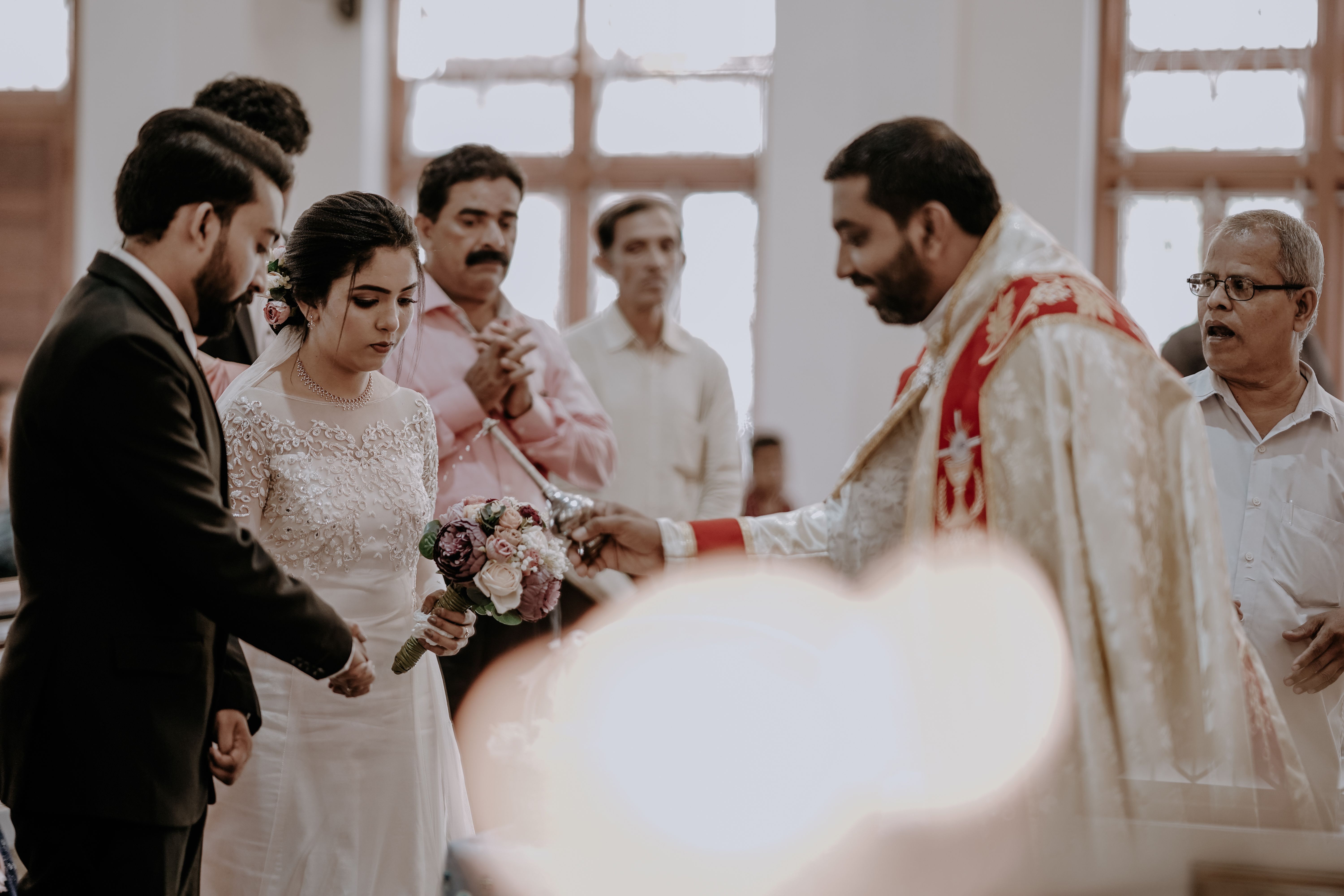 Bride and Groom at the Altar · Free Stock Photo