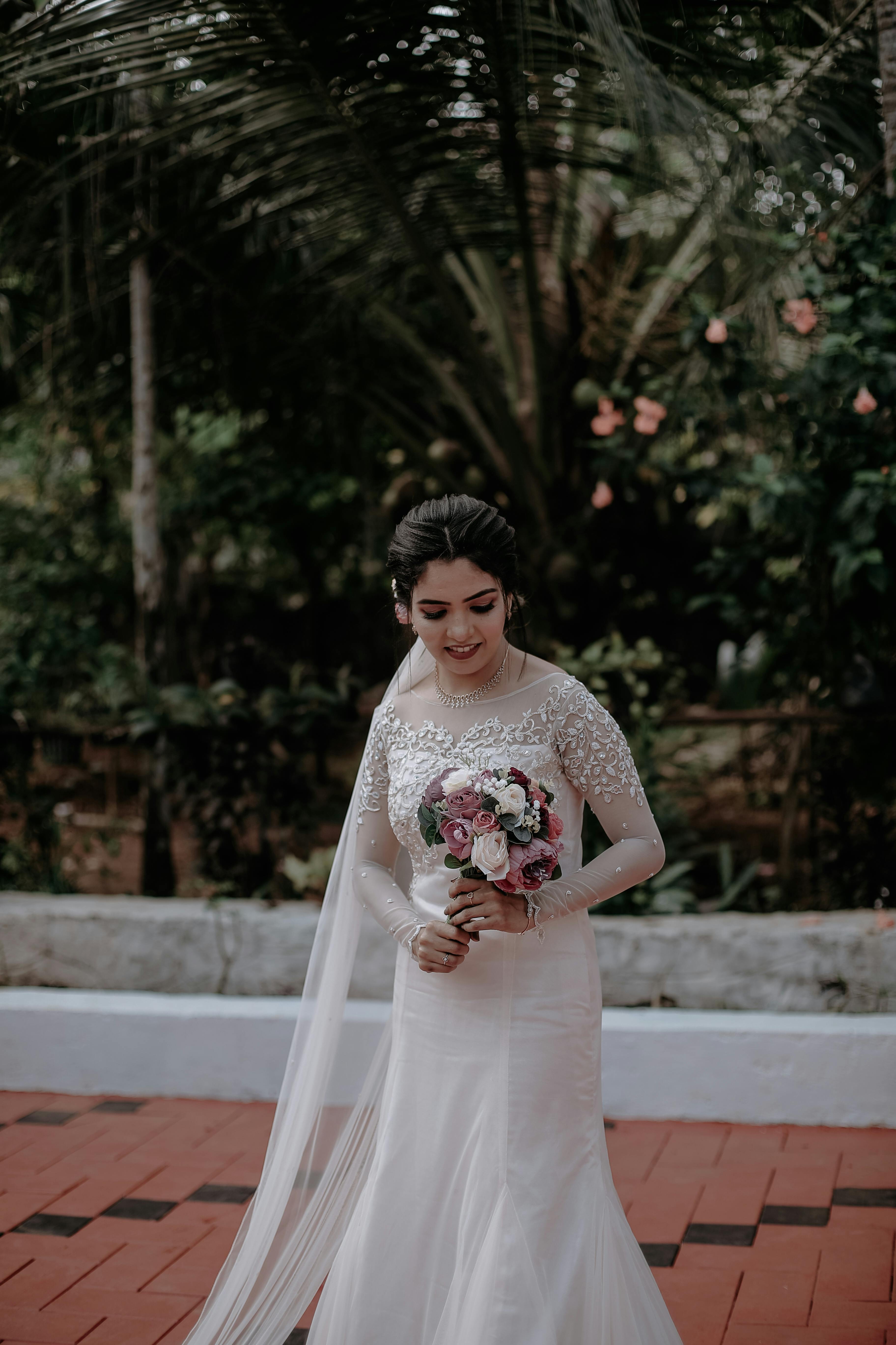 Pensive Bride Looking Out the Window · Free Stock Photo
