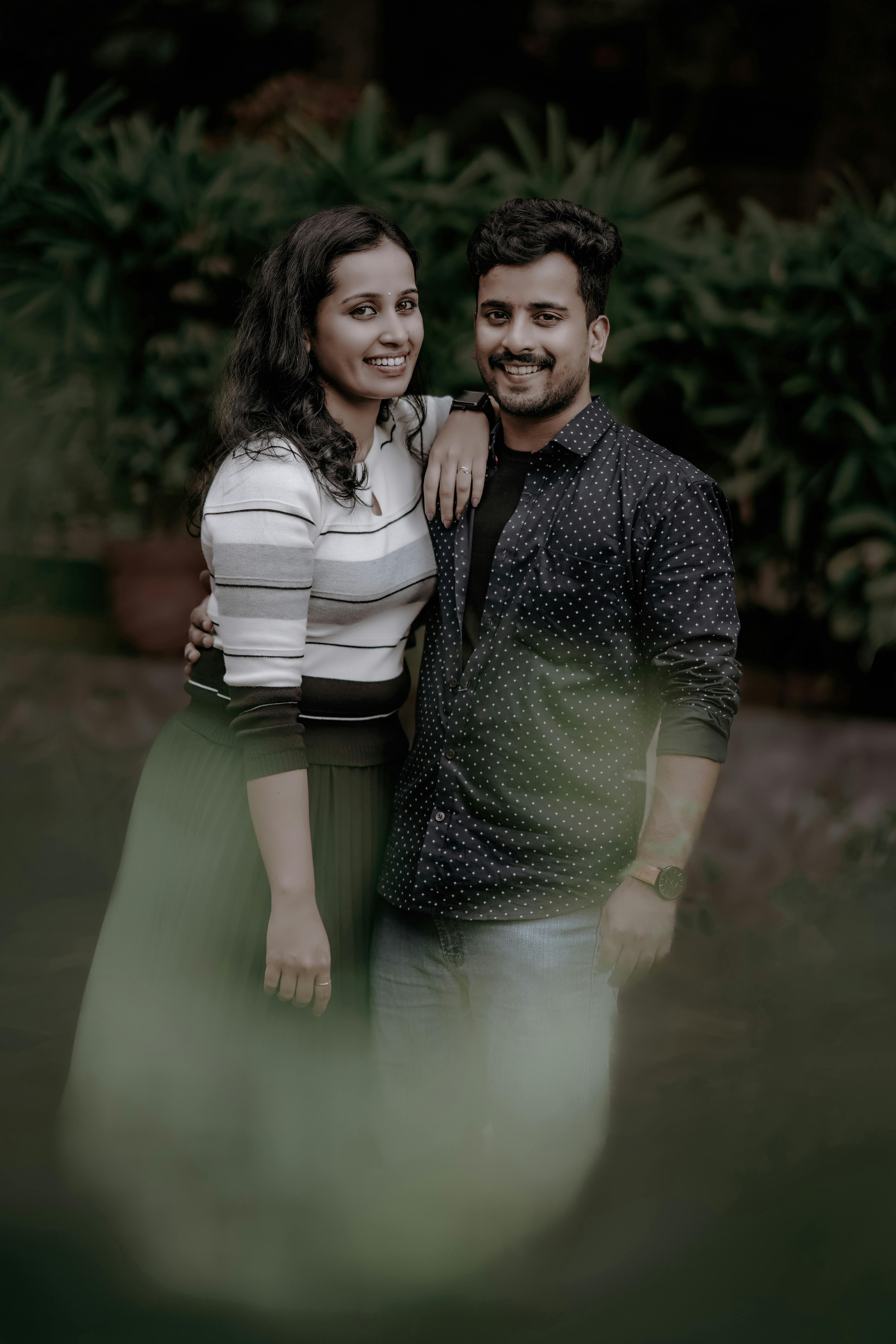 A Woman Putting Her Head on Her Partners Shoulder and Smiling · Free ...