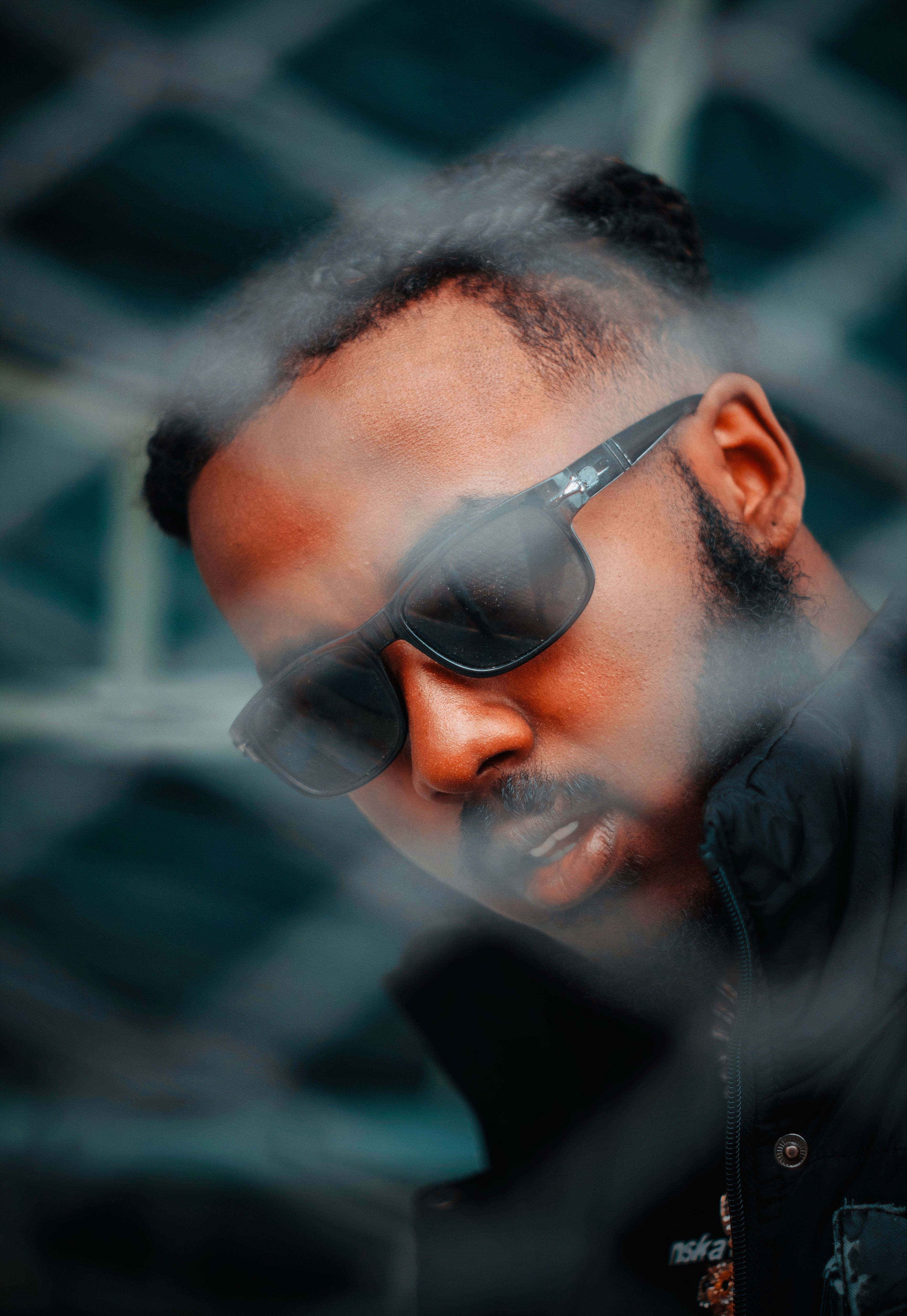 A Man Looking Through the Wire · Free Stock Photo