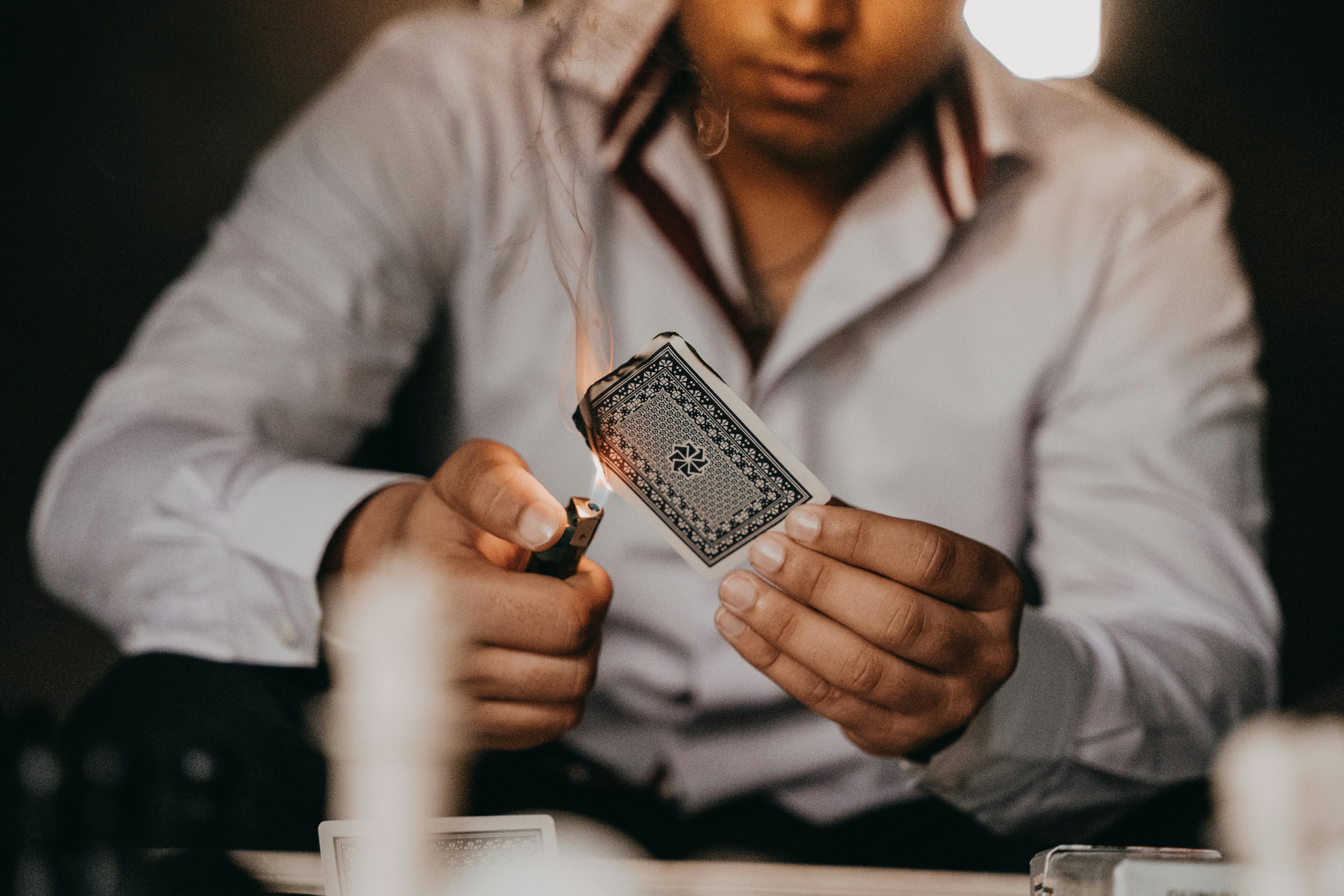 Man Burning Card · Free Stock Photo