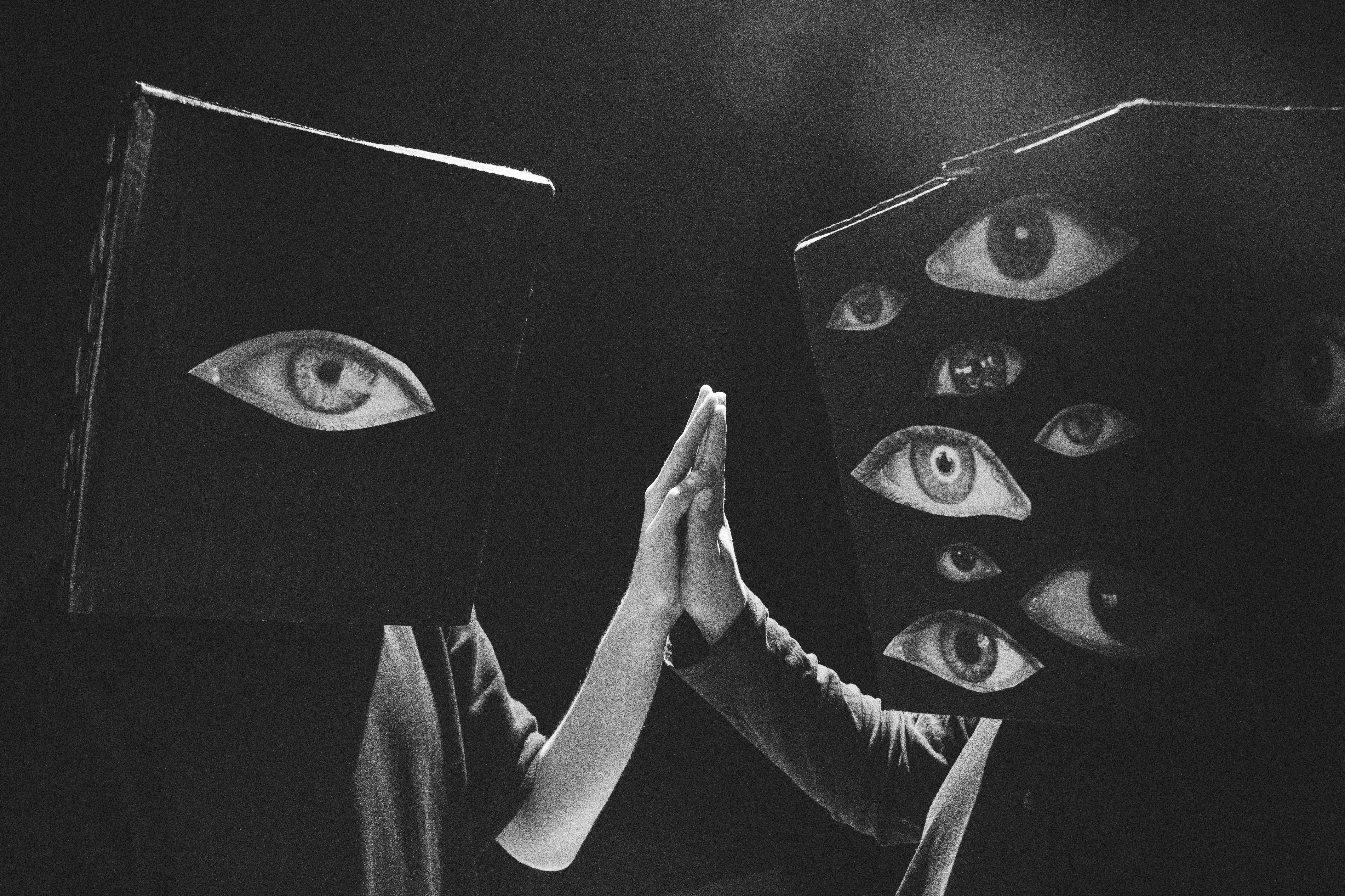 Hands Together and Cubes with Eyes · Free Stock Photo