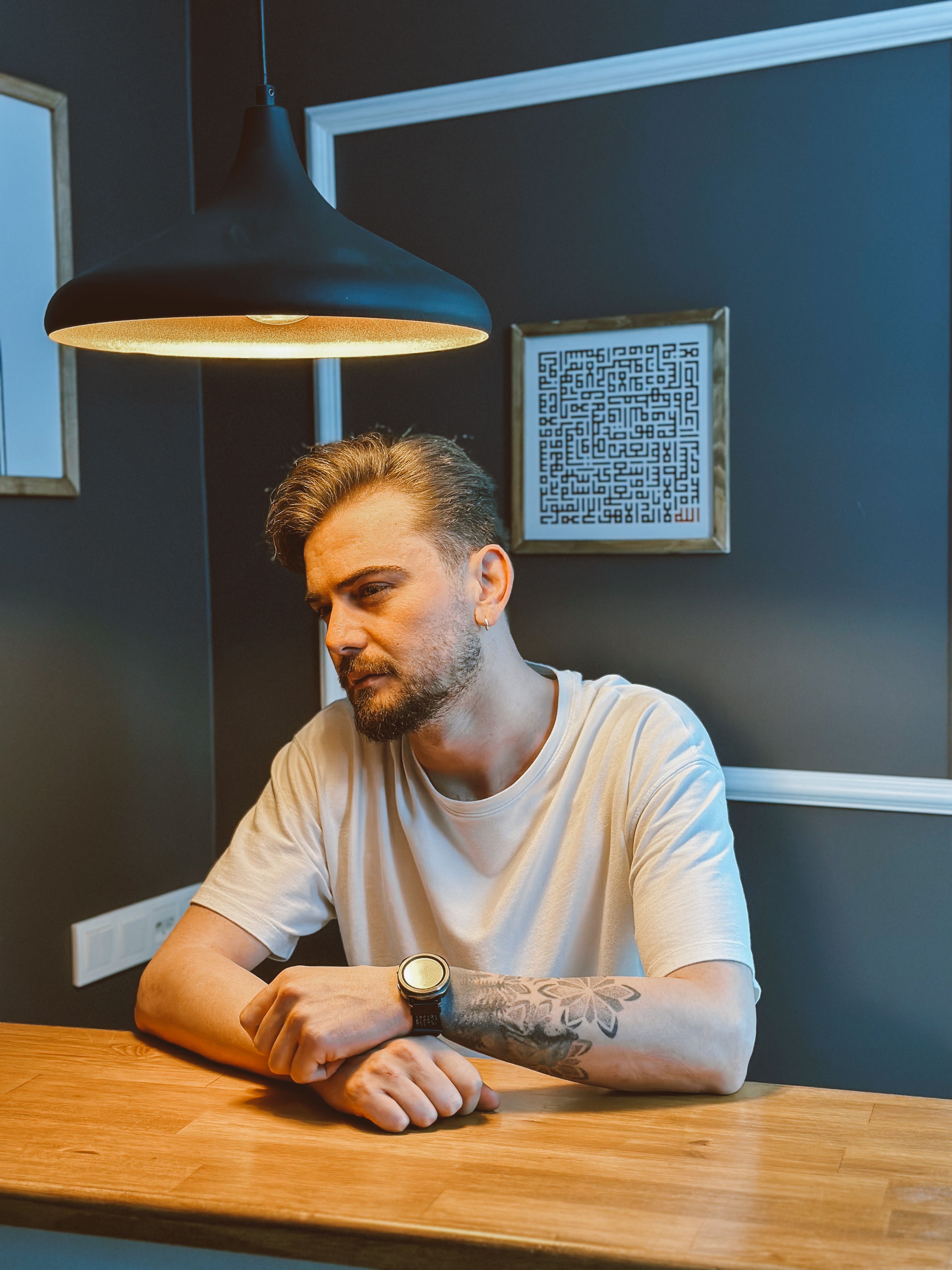 Man Standing by Counter · Free Stock Photo