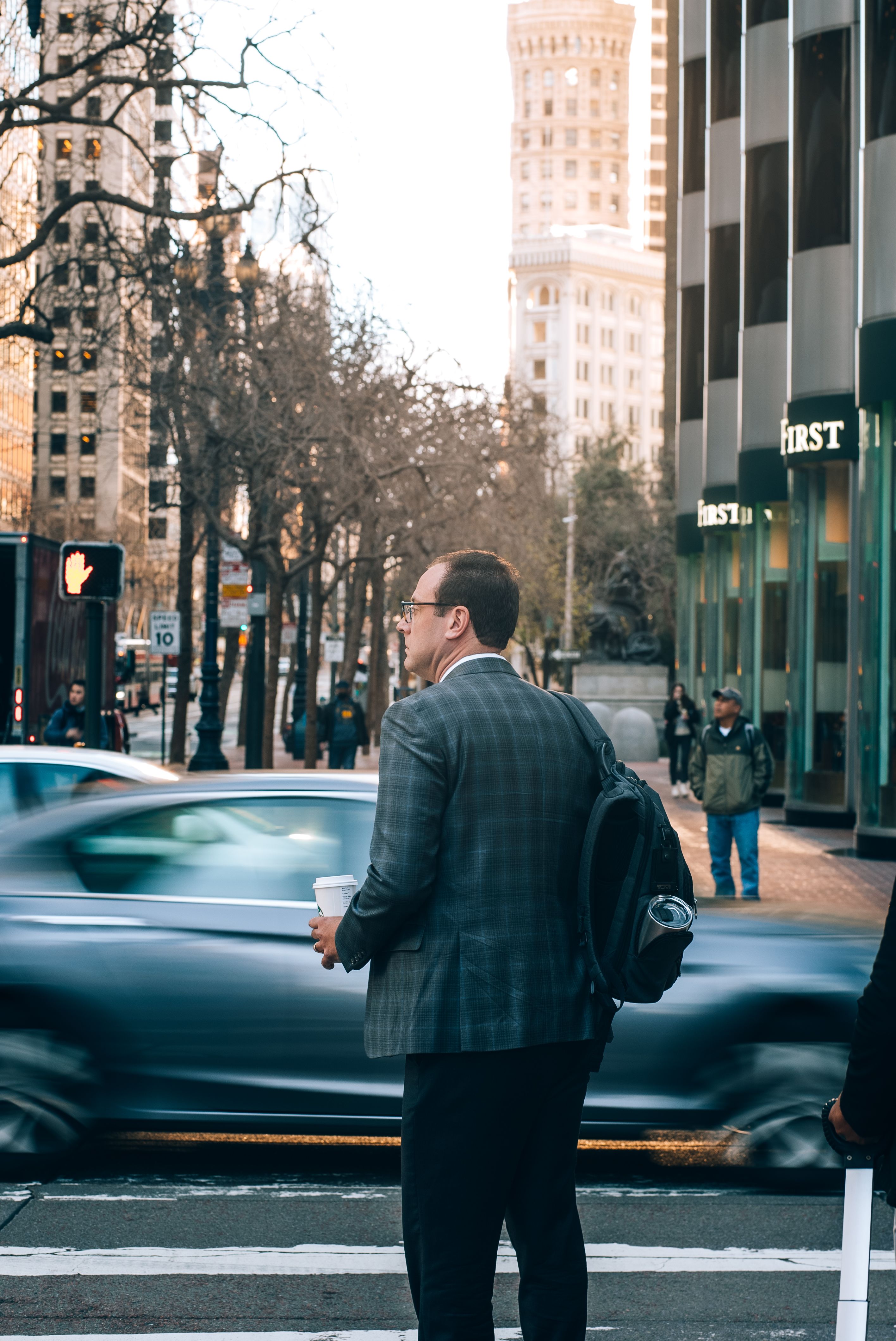 Man Standing near Car on Street · Free Stock Photo