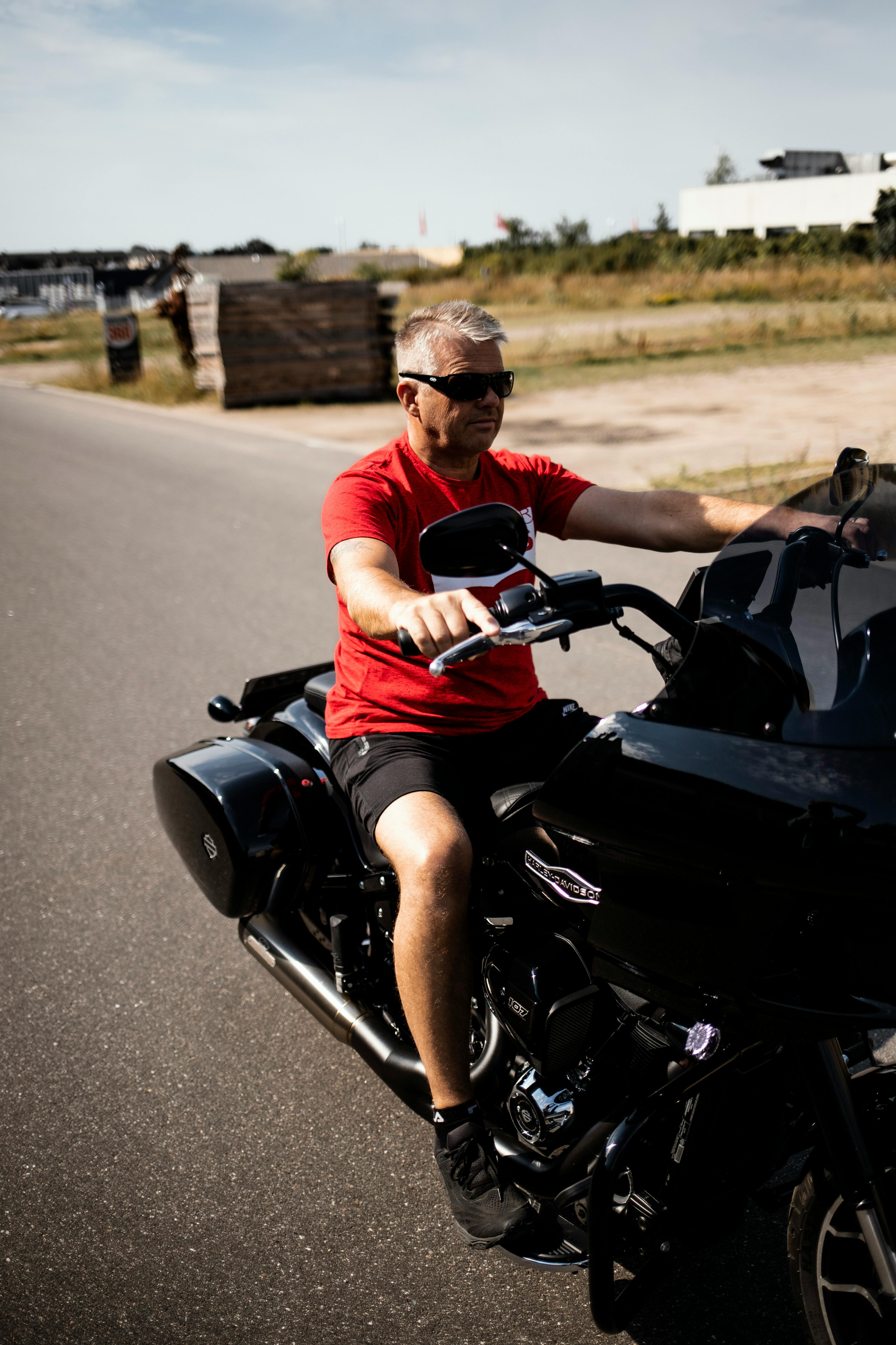 Man on Motorcycle on Road · Free Stock Photo
