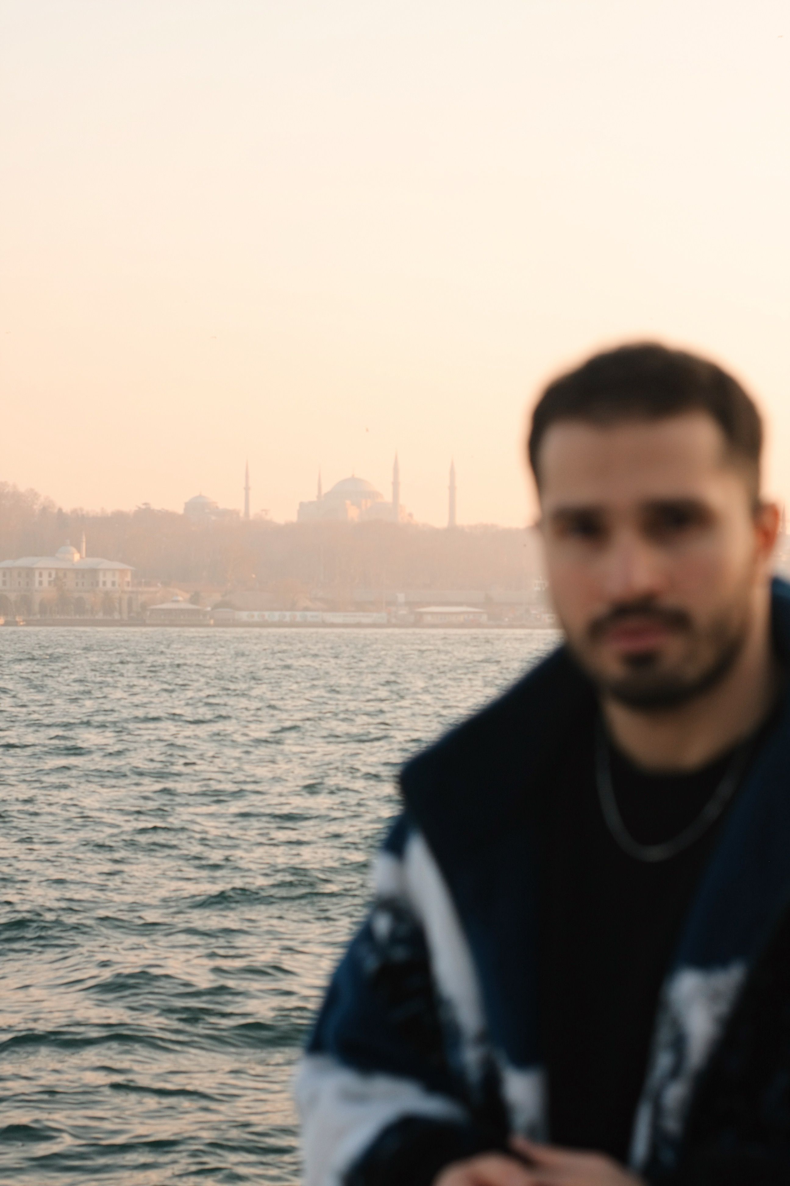 Man Posing in Harbor · Free Stock Photo