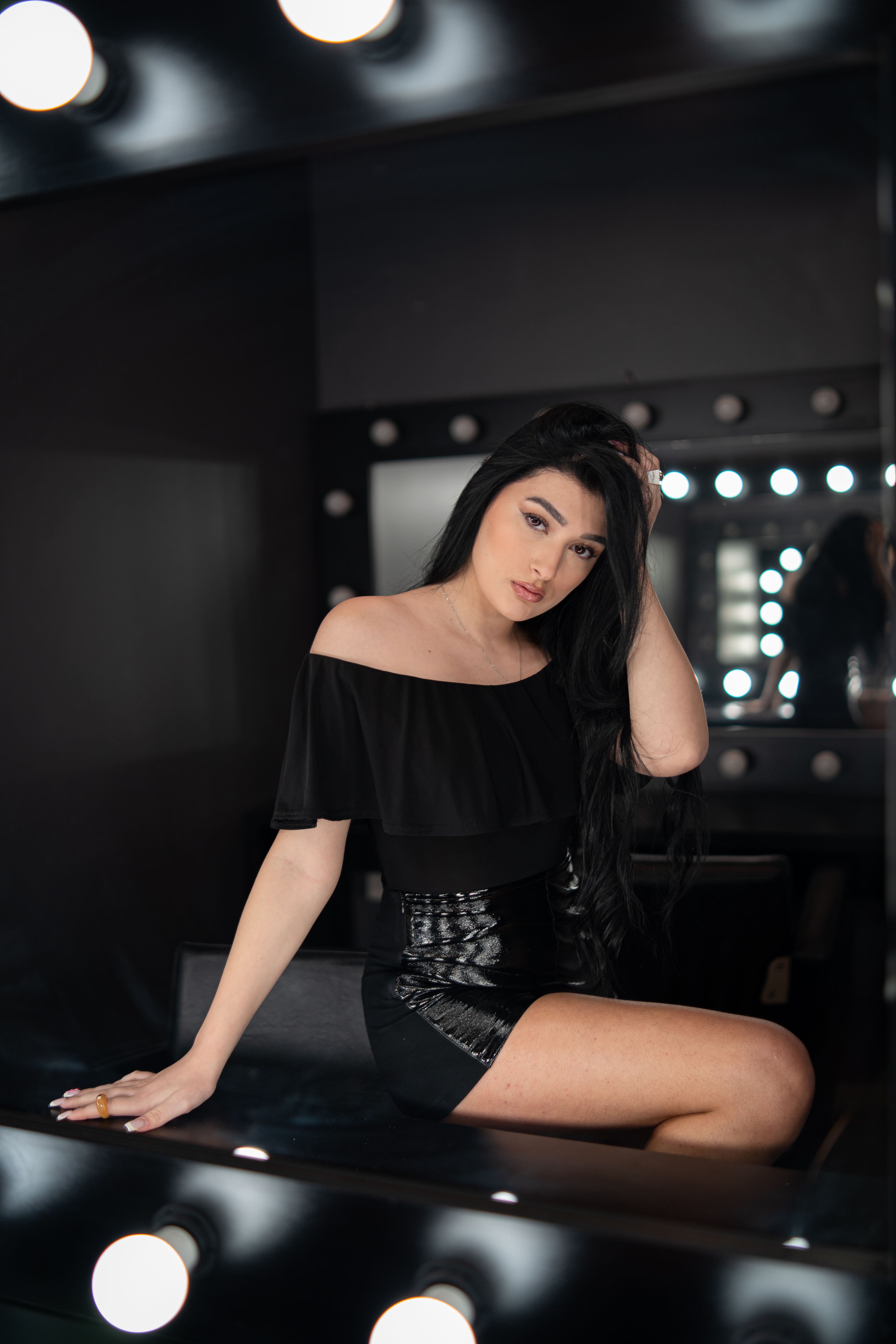 Brunette in Black Mini · Free Stock Photo