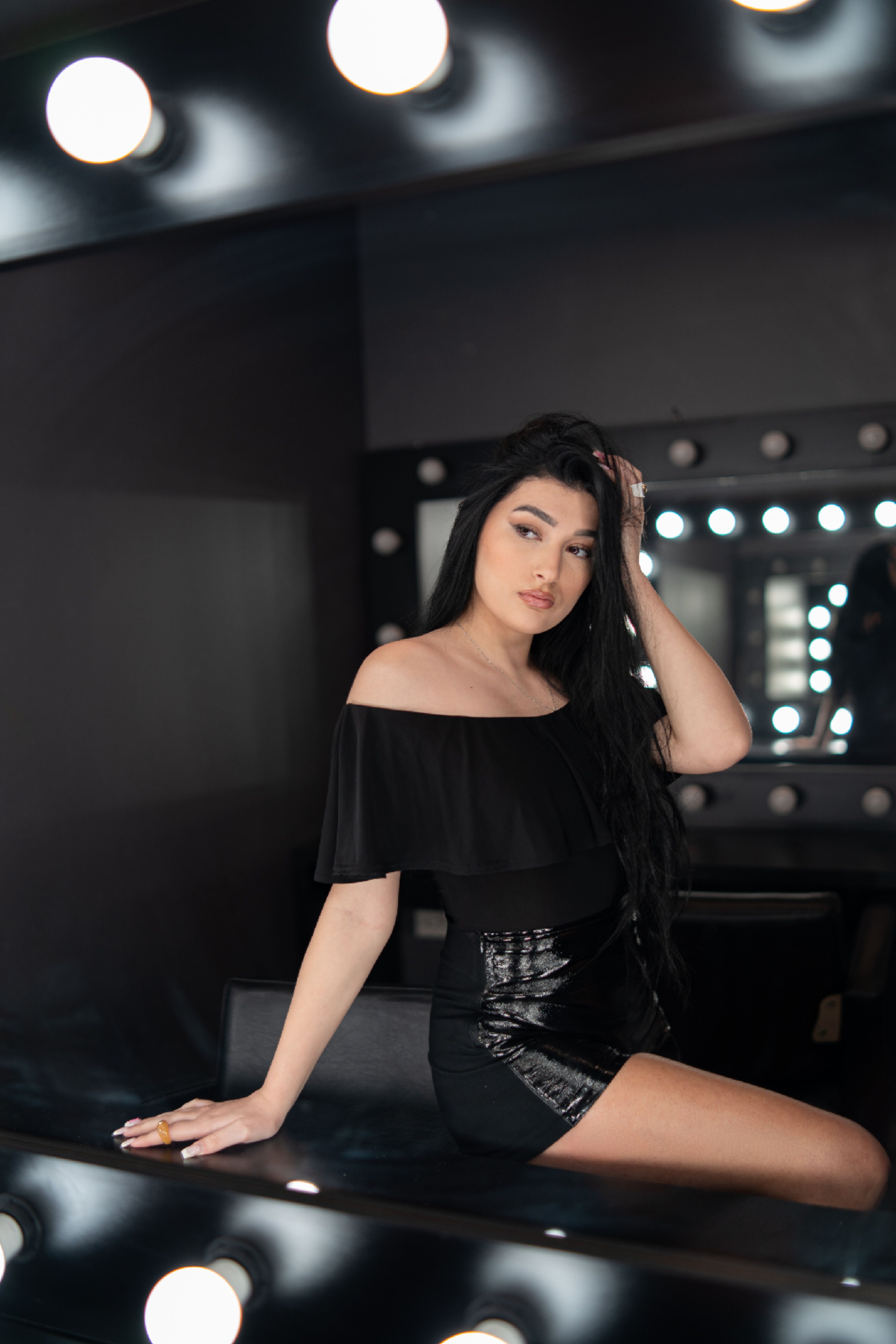 Brunette in Black Mini · Free Stock Photo
