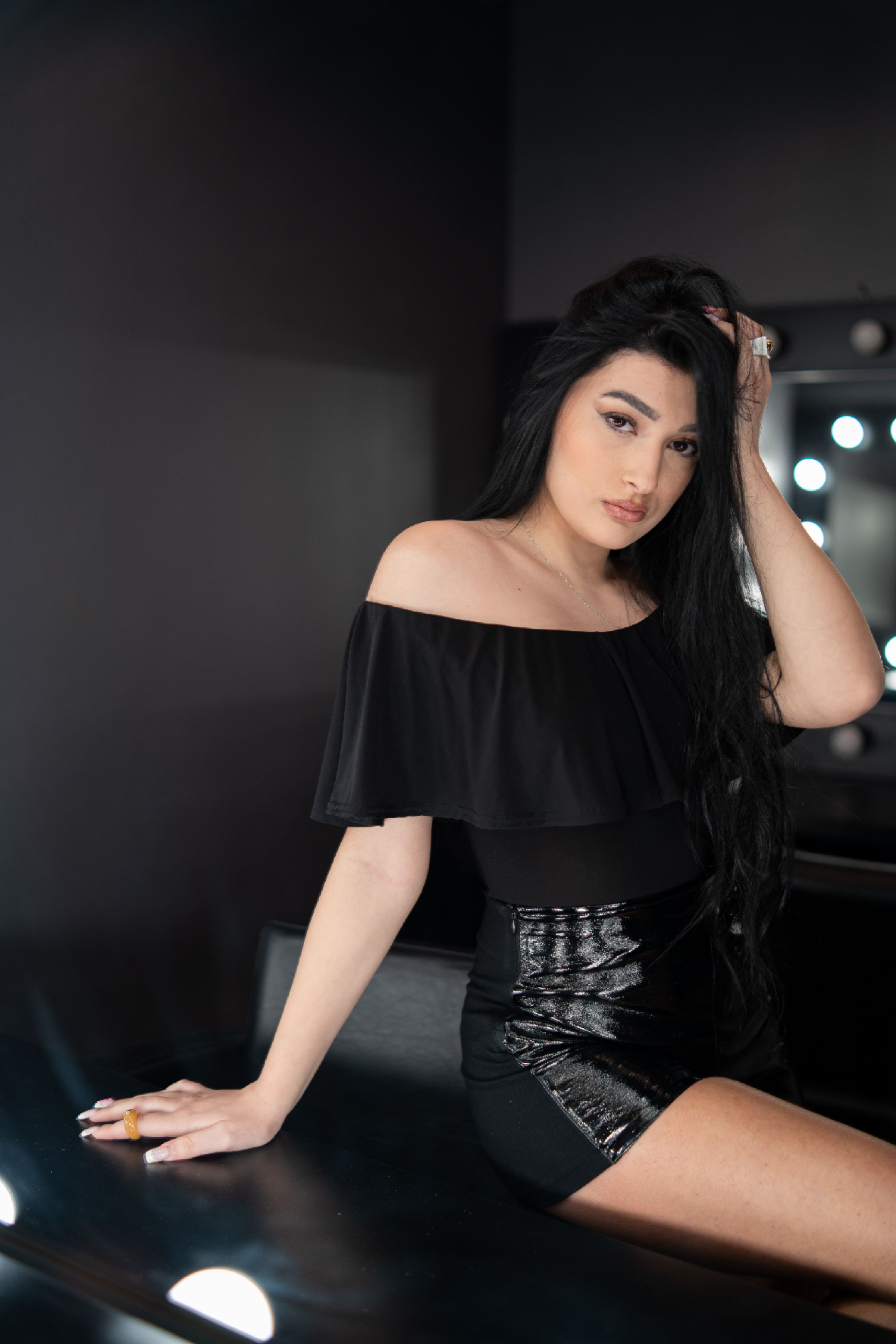 Model Woman Sitting and Posing · Free Stock Photo