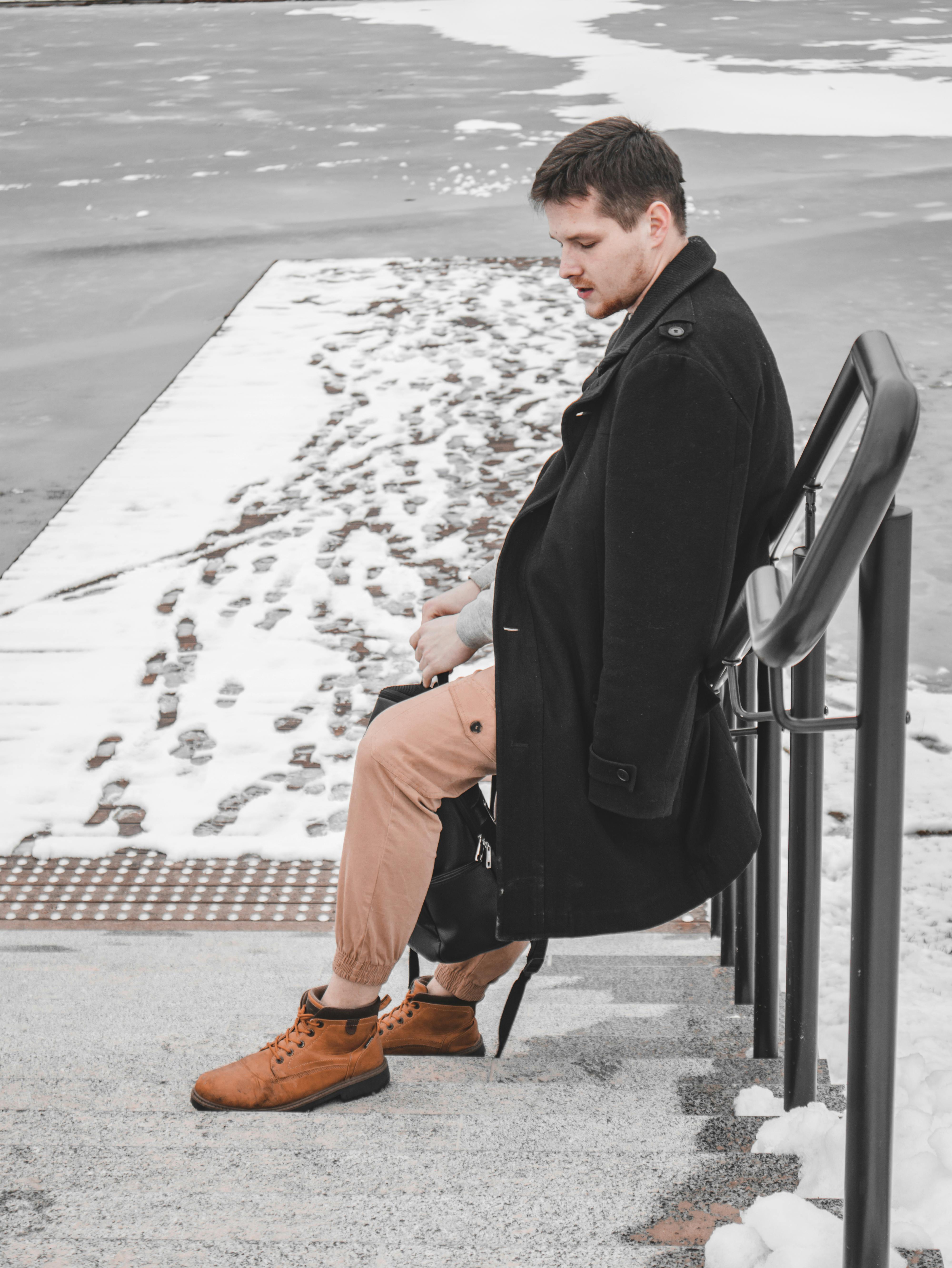 Man Posing by a Railing · Free Stock Photo