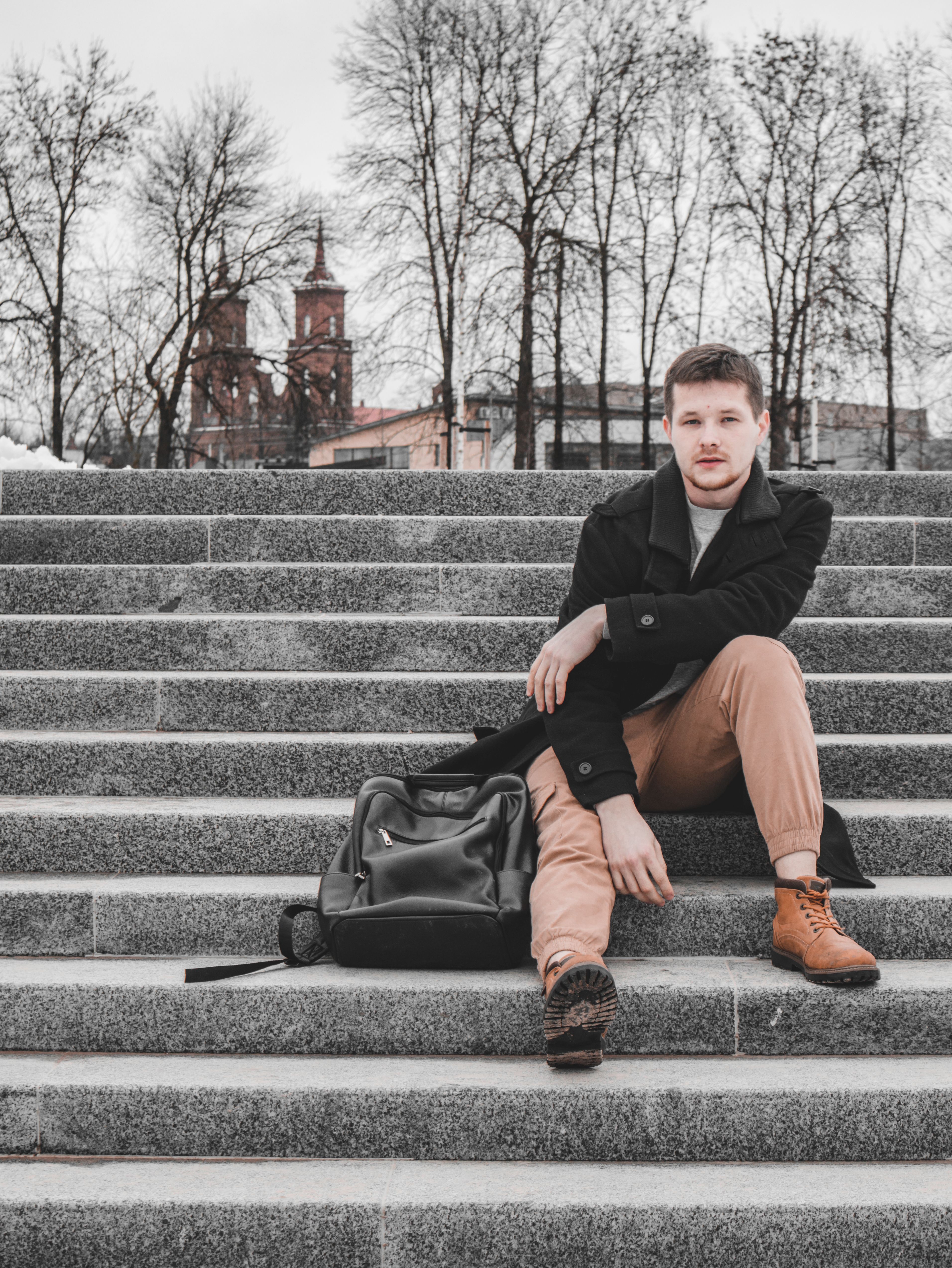 Fashion Model Posing in Black Coat at Steps · Free Stock Photo