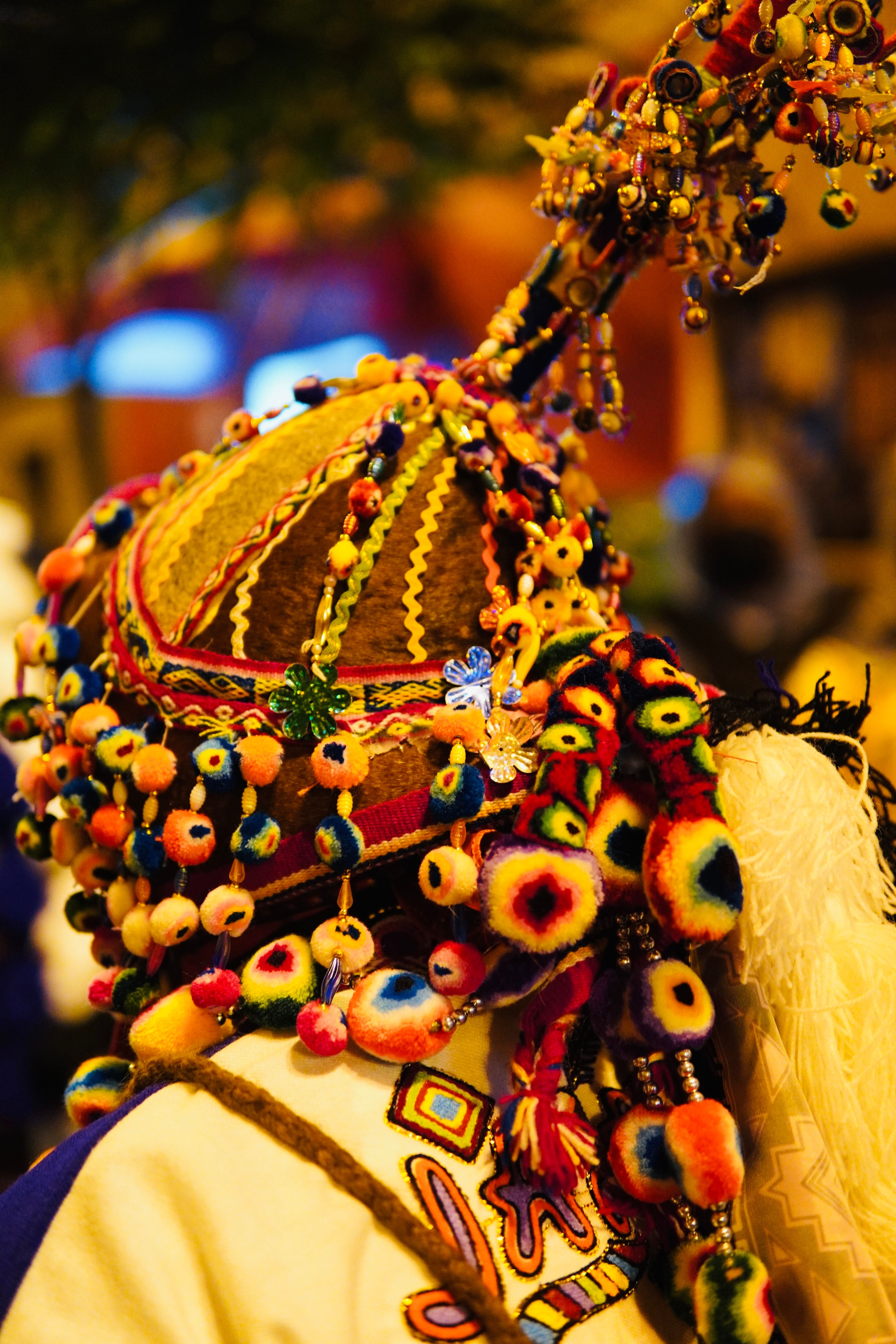 Head of a Person Wearing a Colorful Headdress · Free Stock Photo
