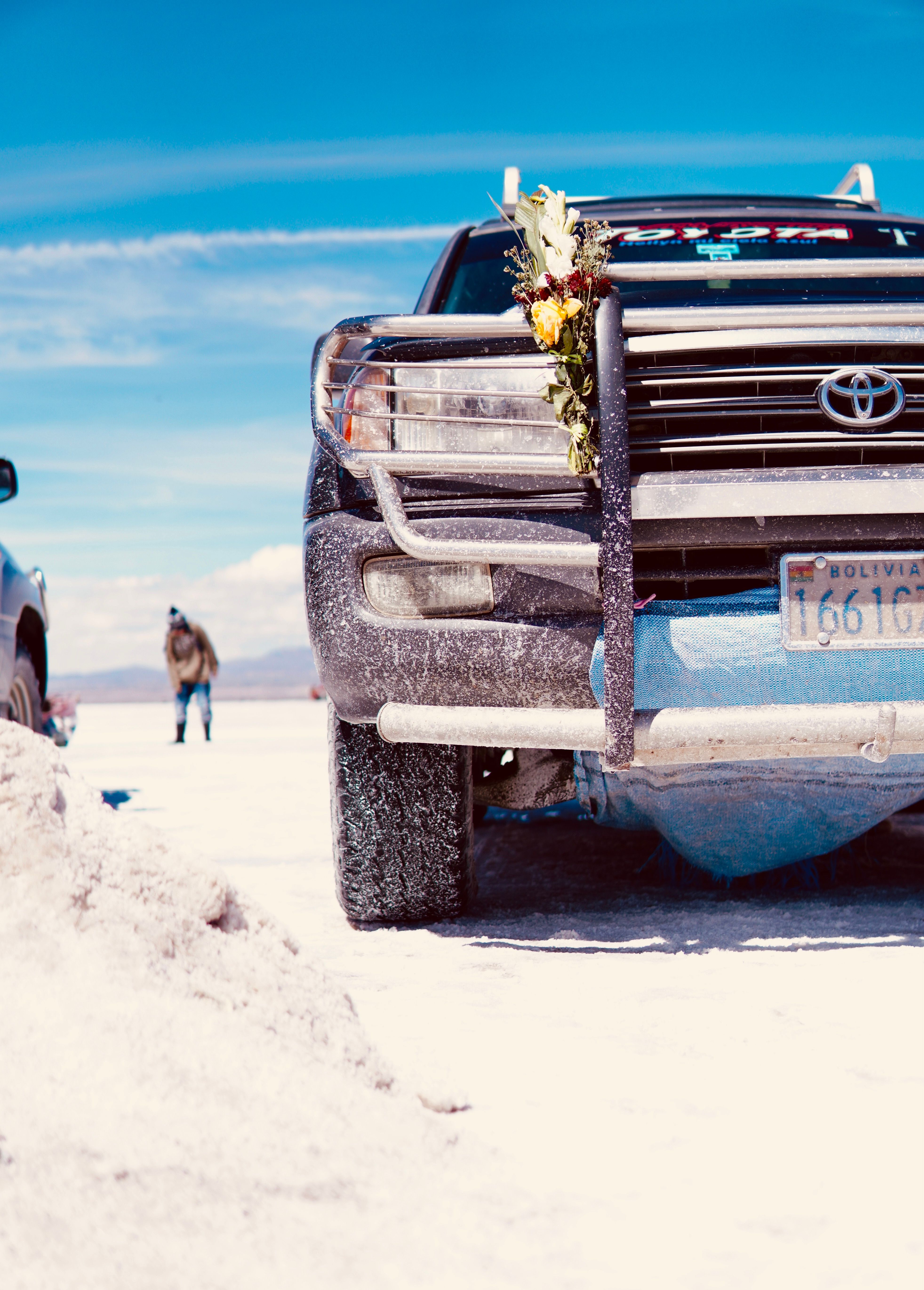 Front of an Off-Road Car Parked in a Desert Area · Free Stock Photo