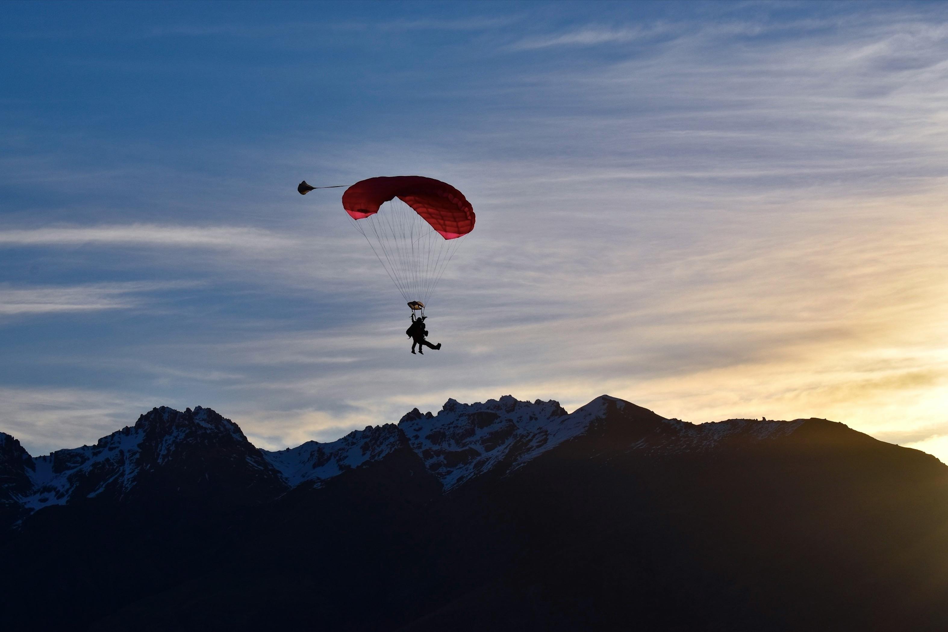 Parachuting over Mountains · Free Stock Photo