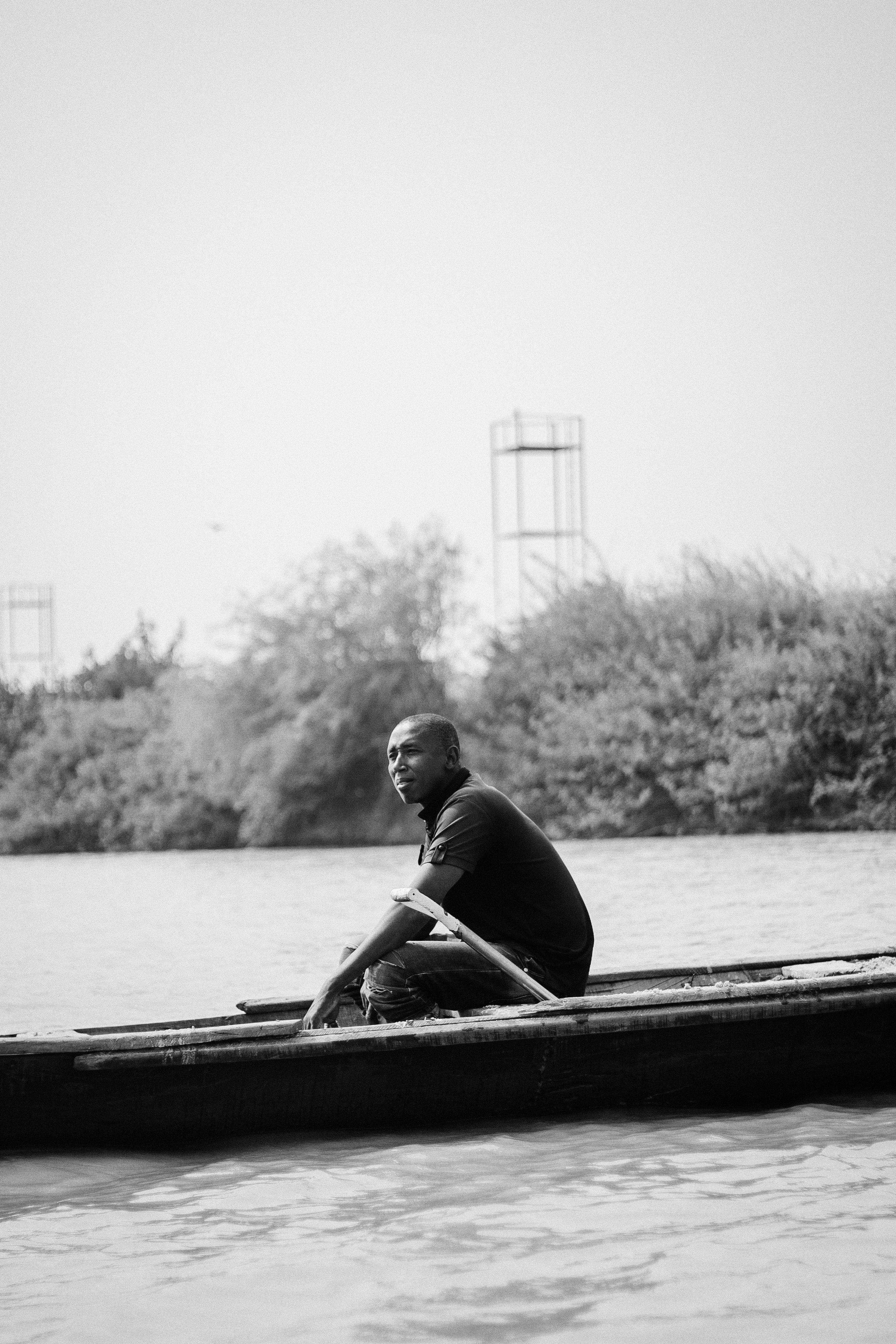 Rowing Man in Black and White · Free Stock Photo