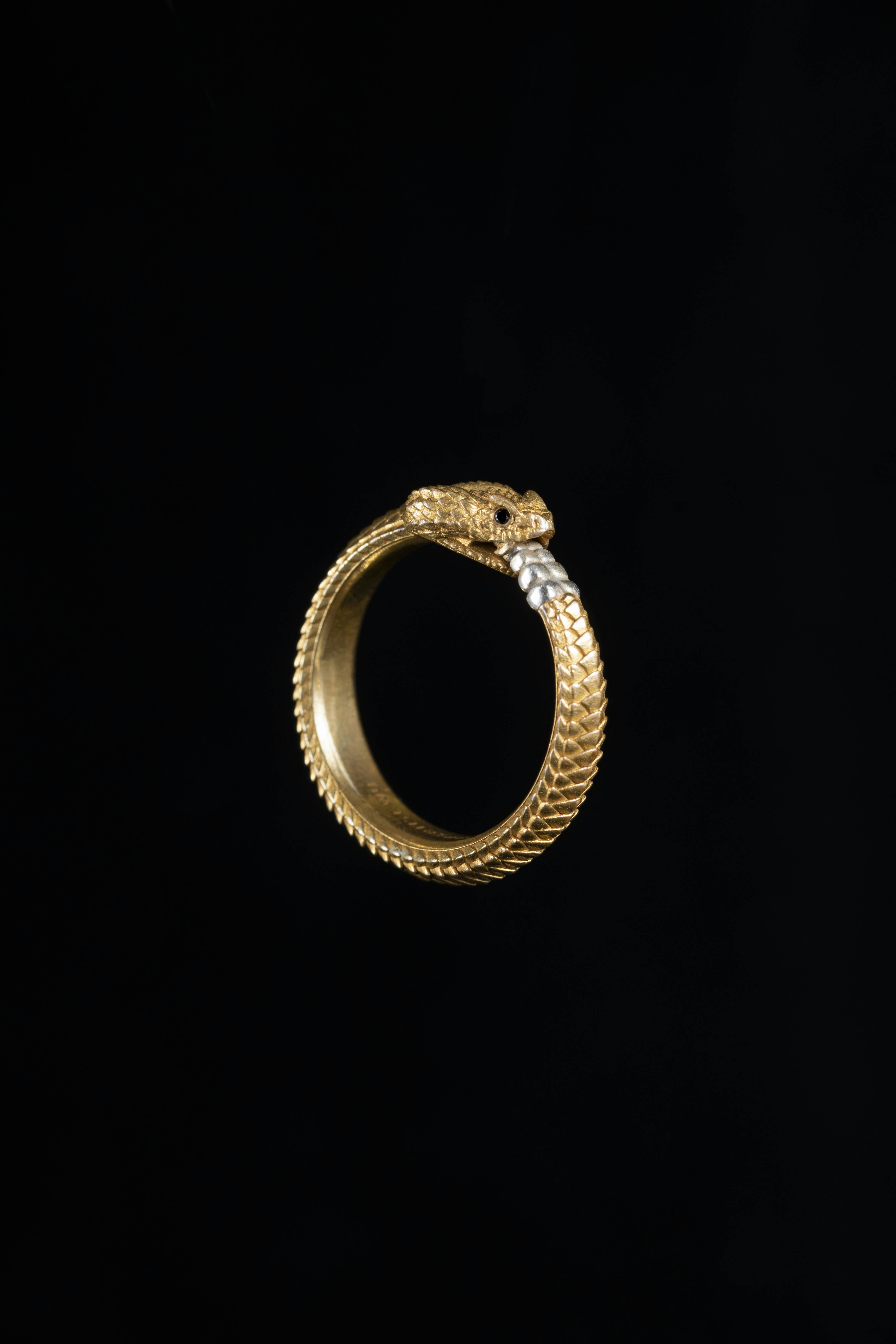 Golden Ring Against Black Background · Free Stock Photo