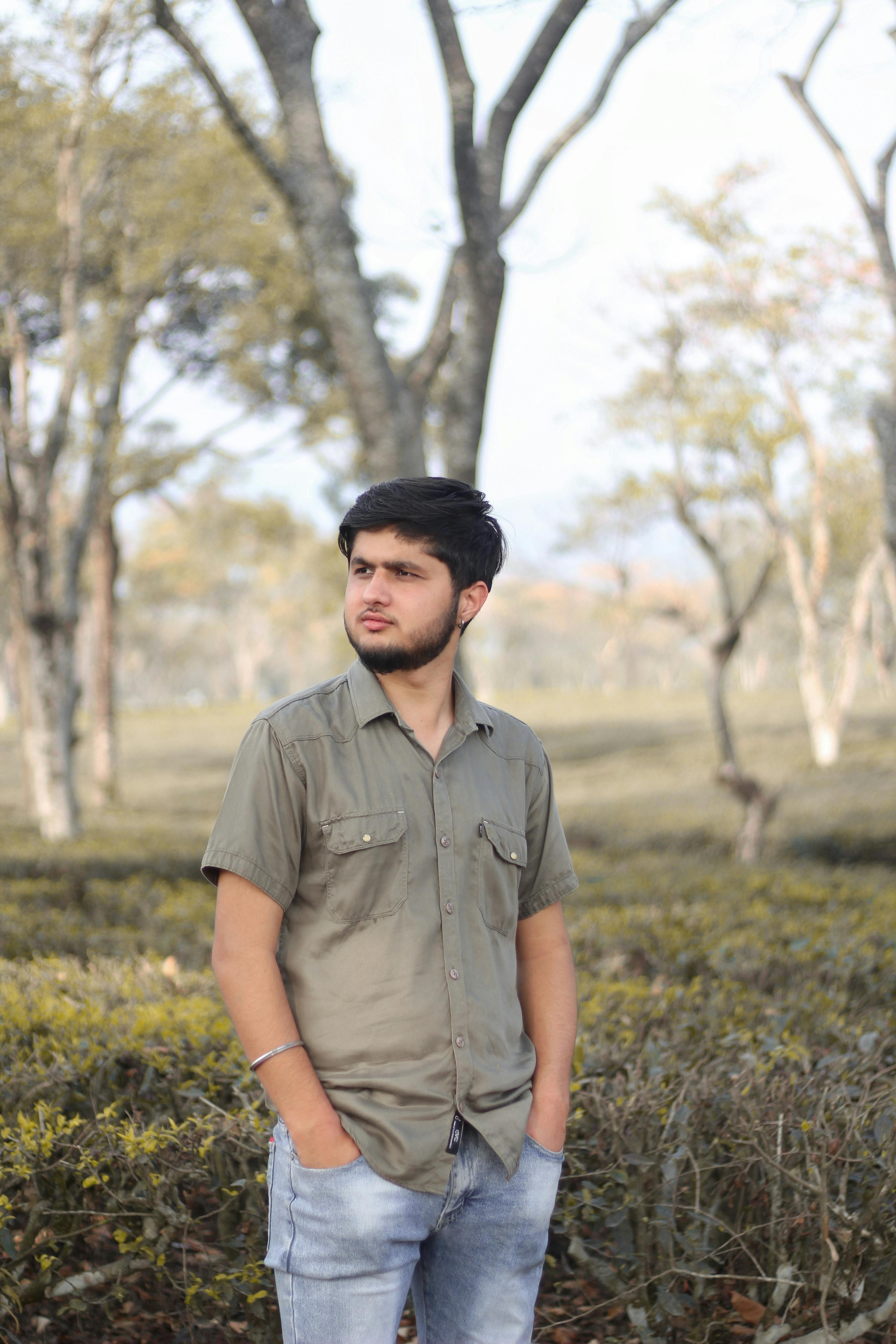 Man in Jeans with Bicycle · Free Stock Photo