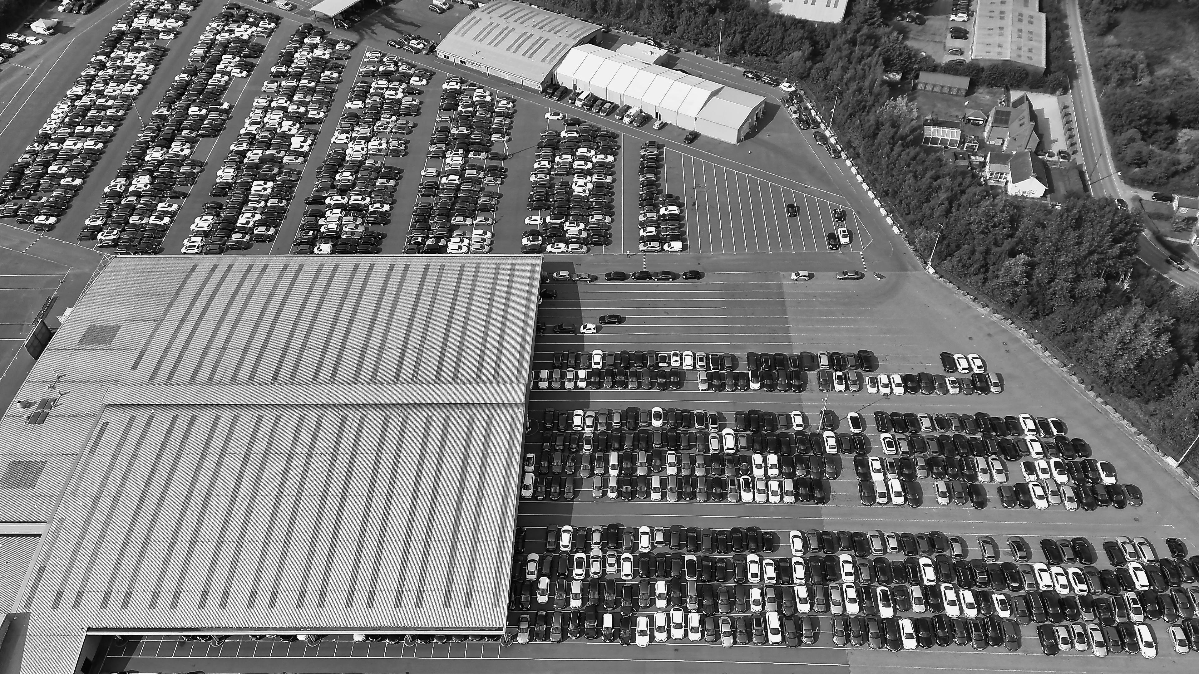 Aerial Photography of Parking Lot With Trees · Free Stock Photo