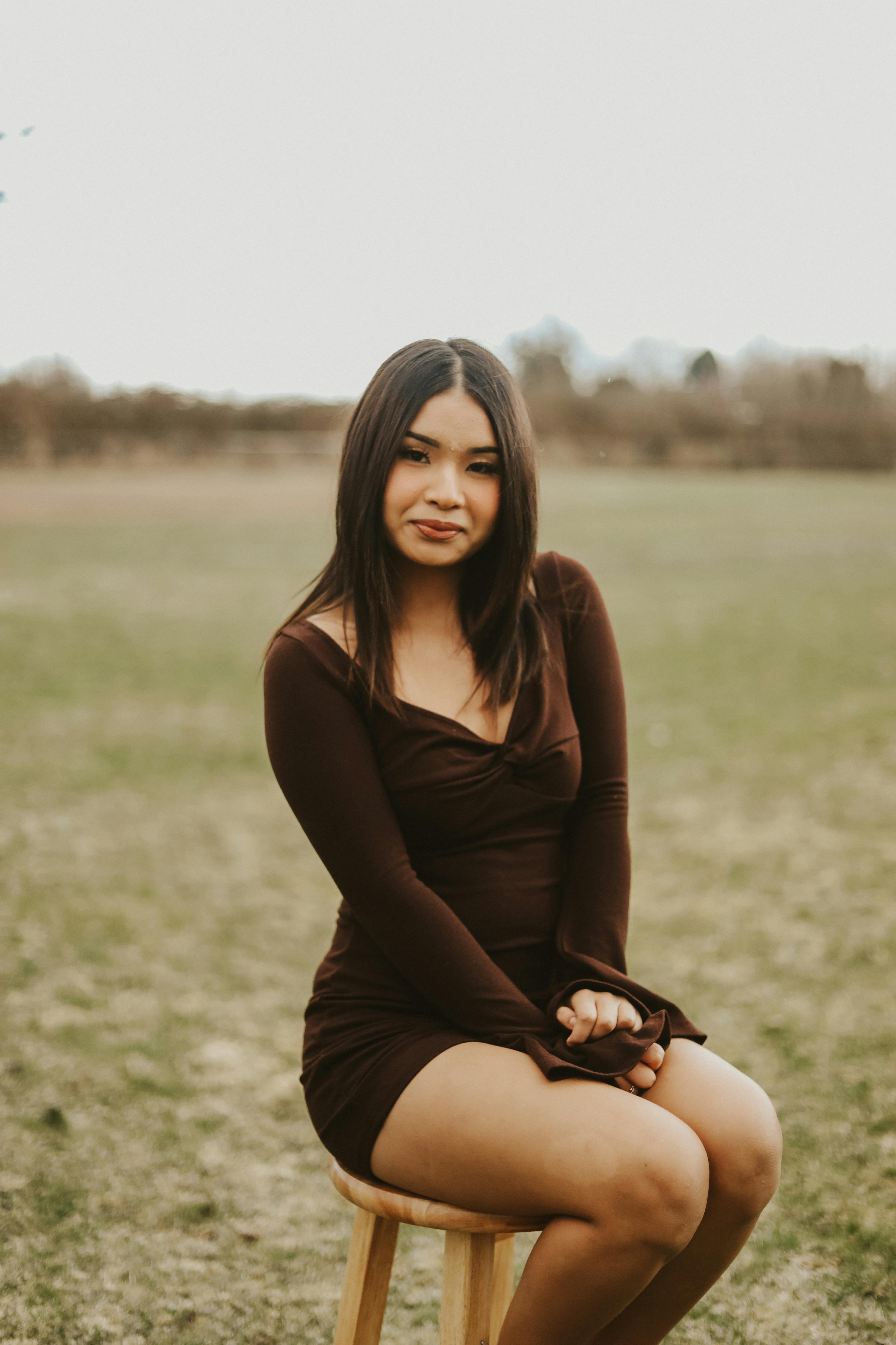 Woman Posing on Stool · Free Stock Photo