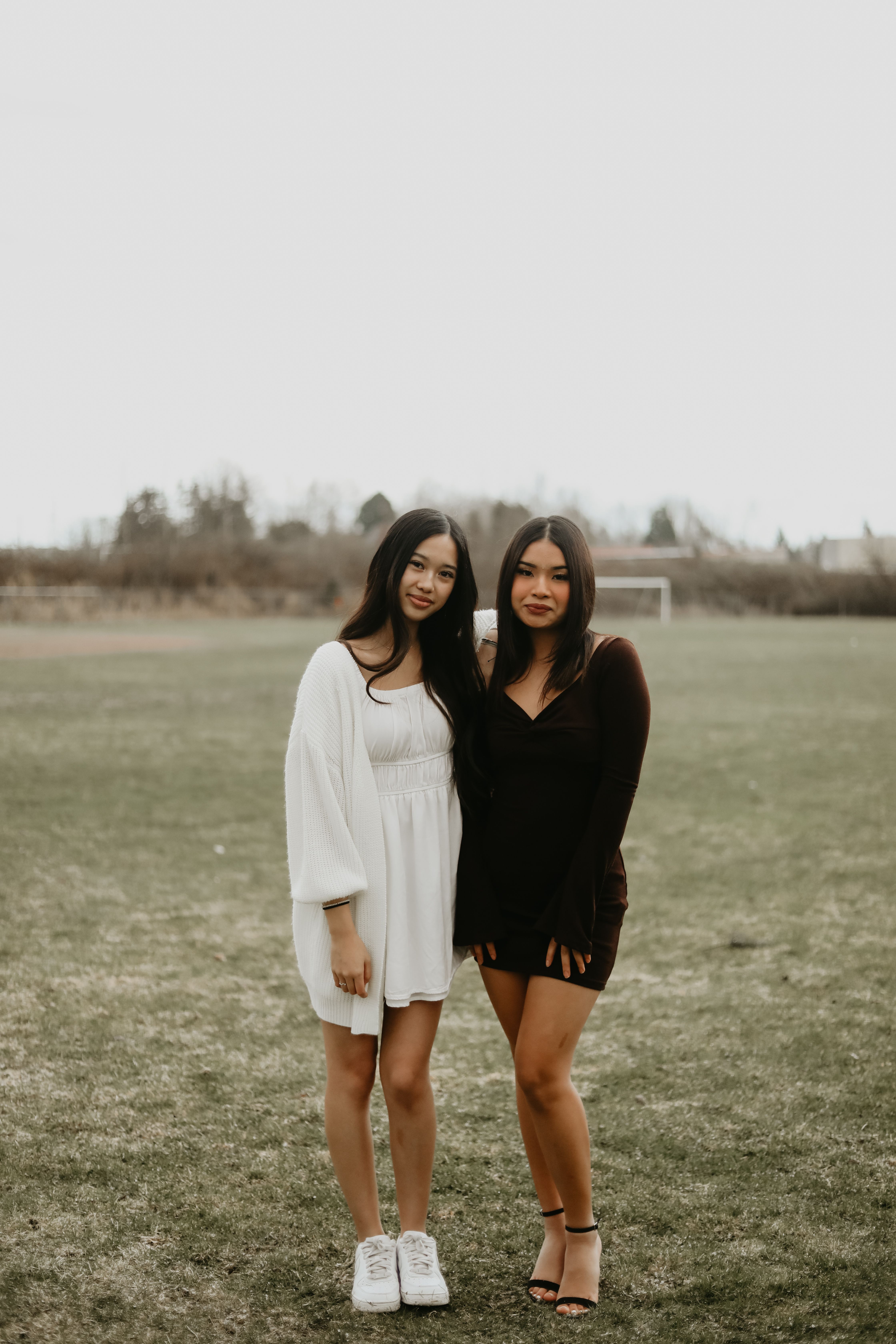 Women Standing Arm in Arm · Free Stock Photo