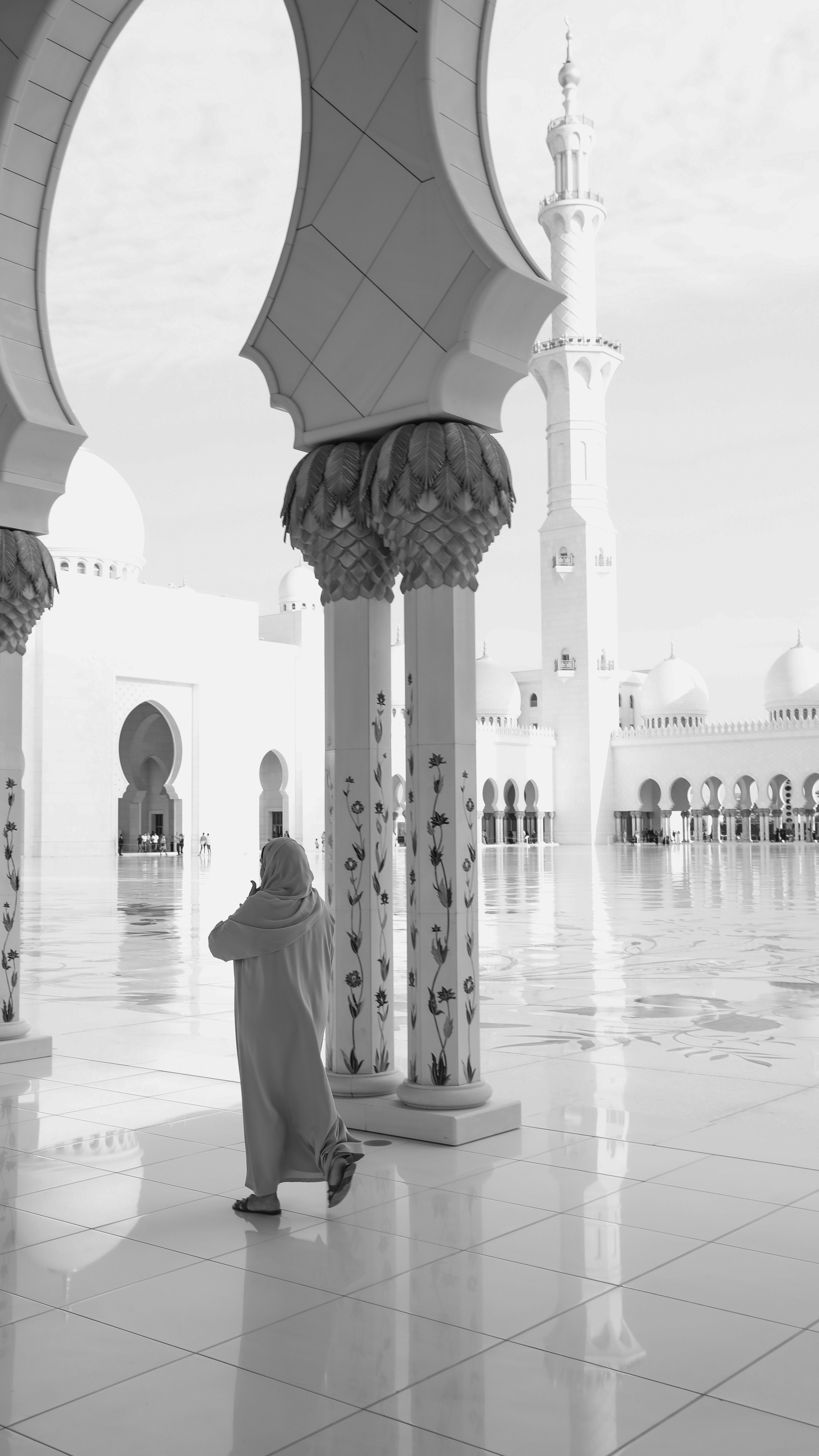 Aerial View of a Woman Standing on a Mosaic Ground in the Mosque · Free ...