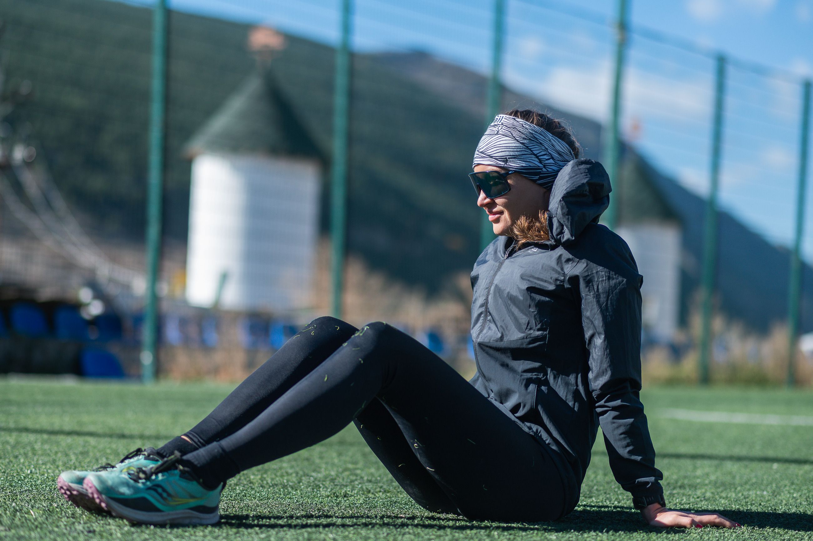 Woman Sitting on Pitch · Free Stock Photo