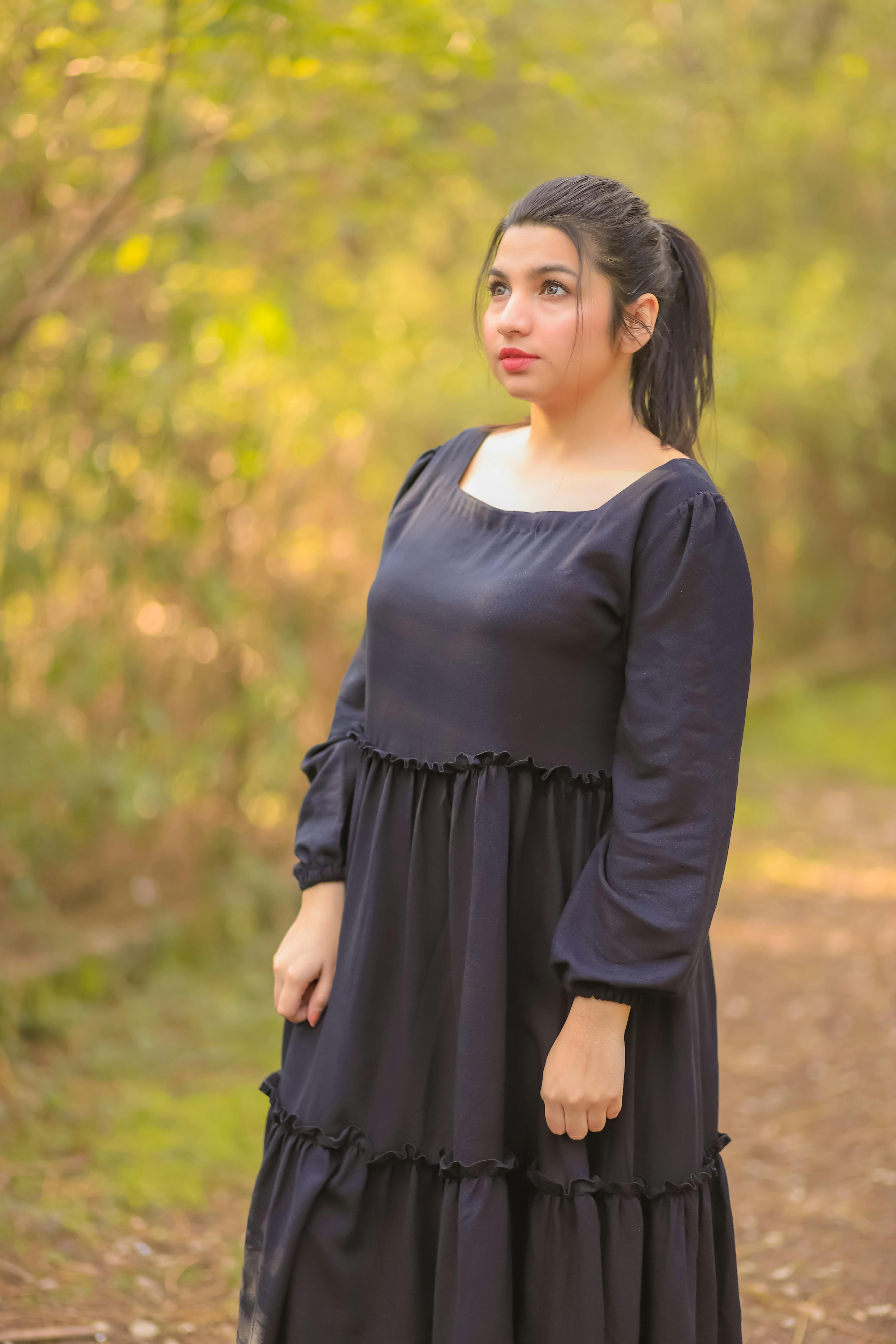 Woman Running in Blossoming Orchard · Free Stock Photo