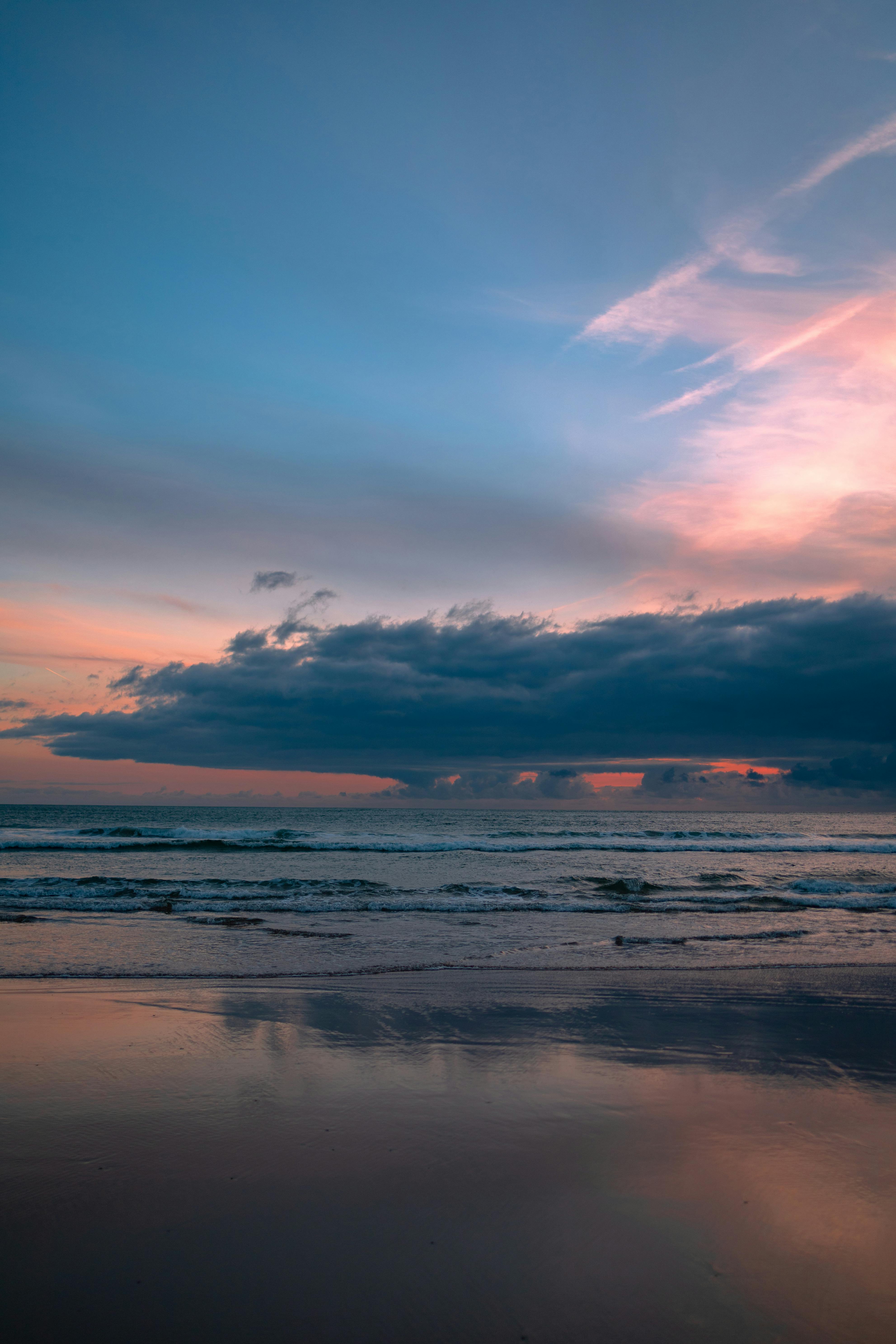 Foto profissional gratuita de à beira mar, água, alvorecer, ao ar livre ...