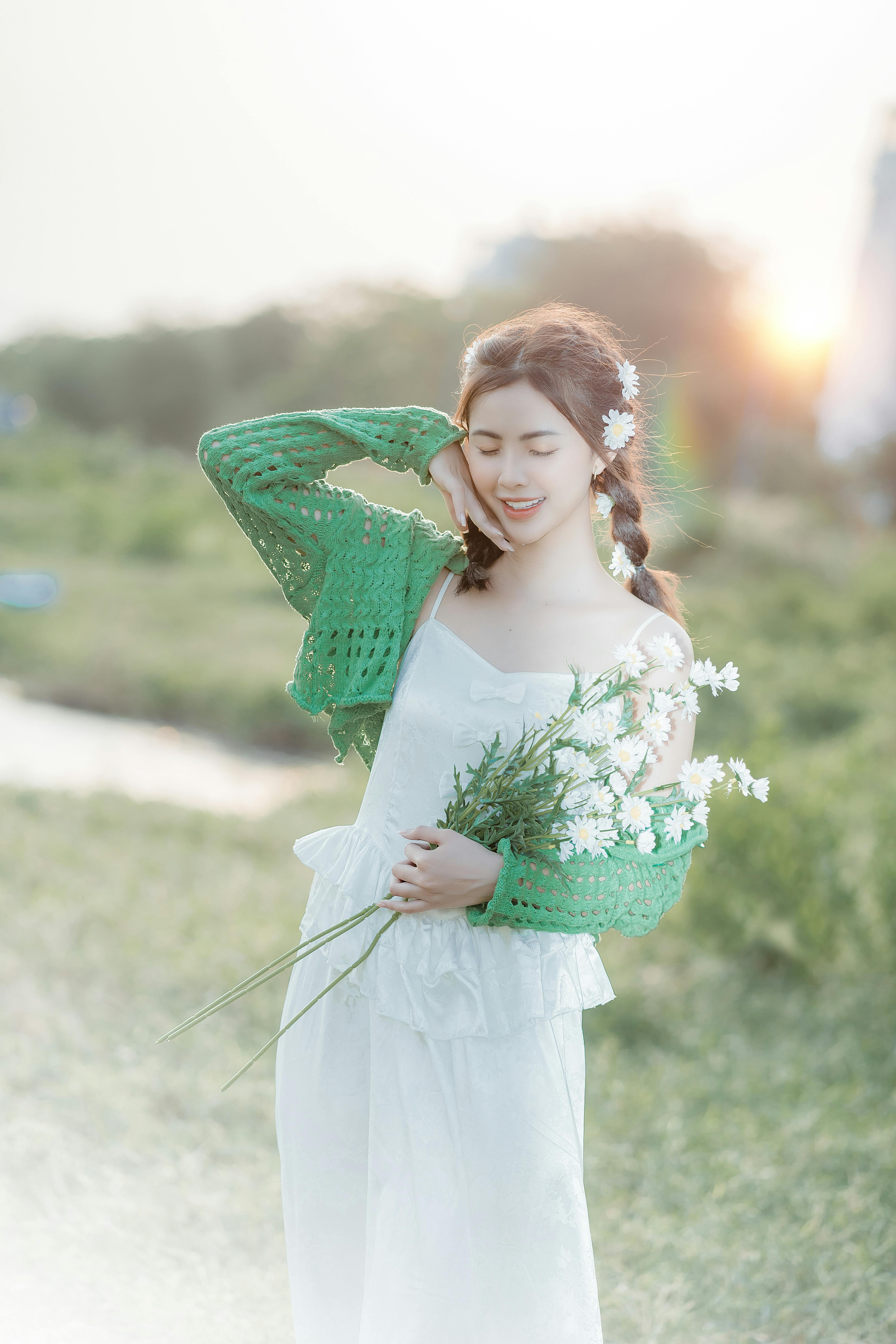 A Woman Standing Beside the Tree · Free Stock Photo