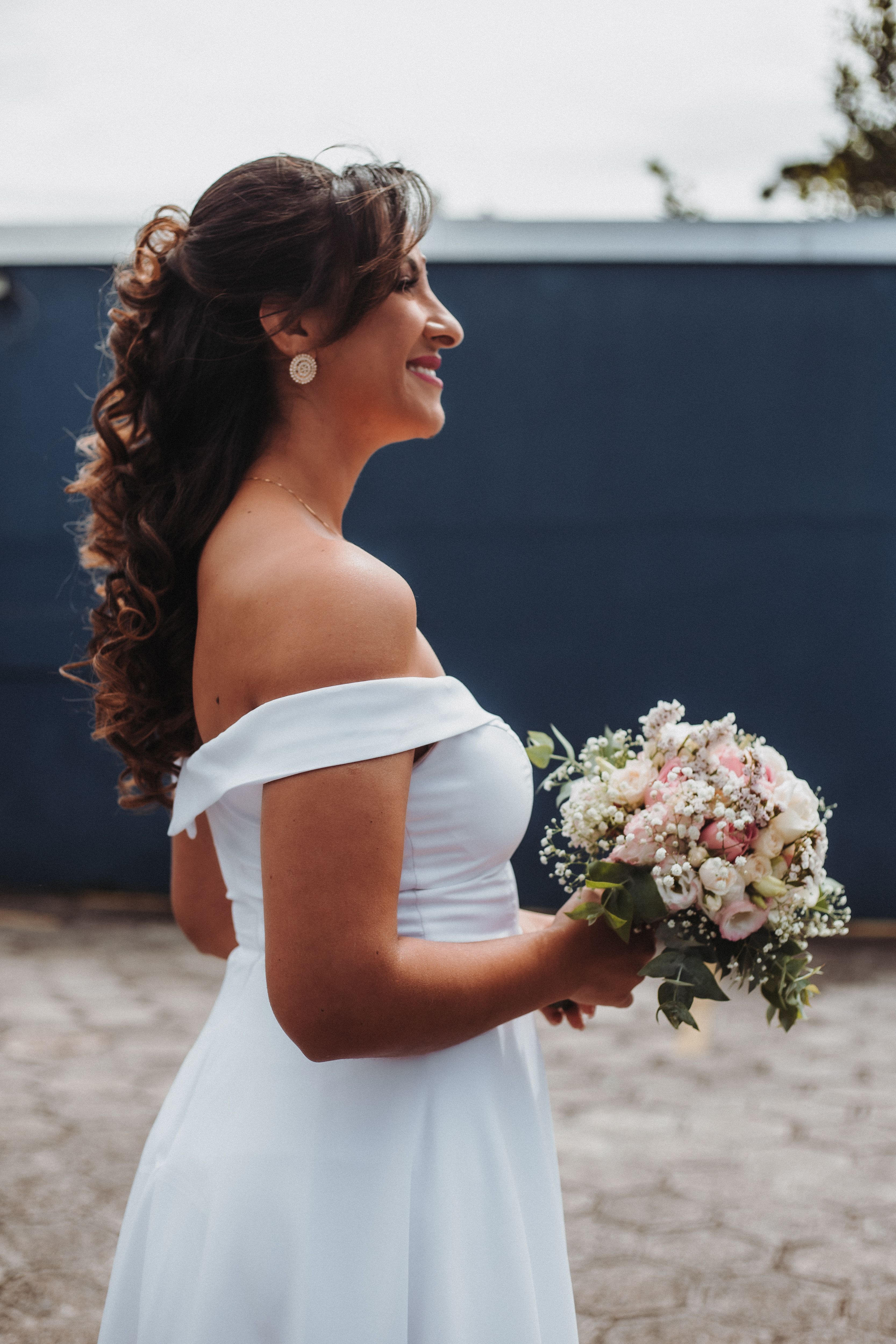 A Front View of a Smiling Newlywed Couple · Free Stock Photo