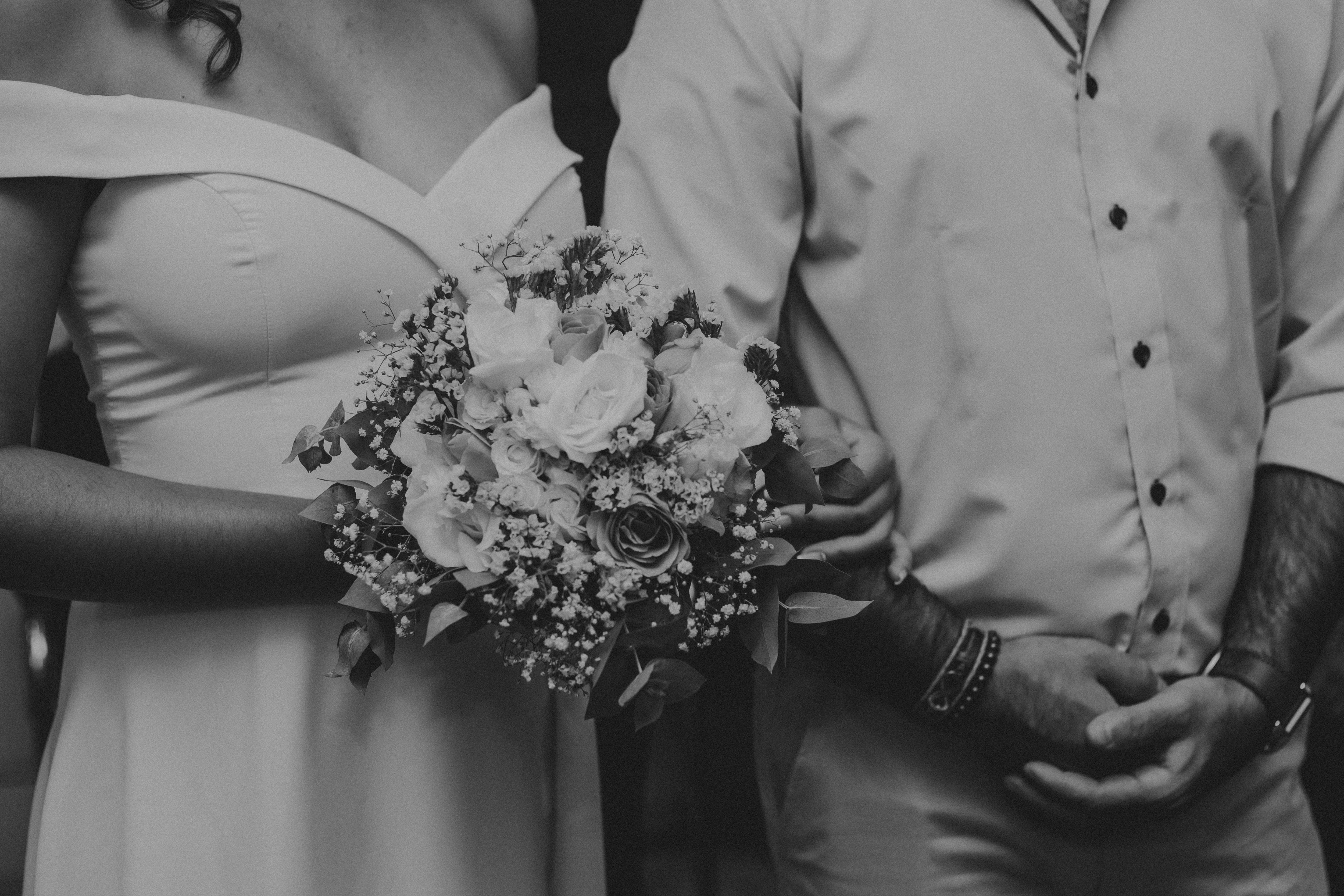 A Front View of a Smiling Newlywed Couple · Free Stock Photo