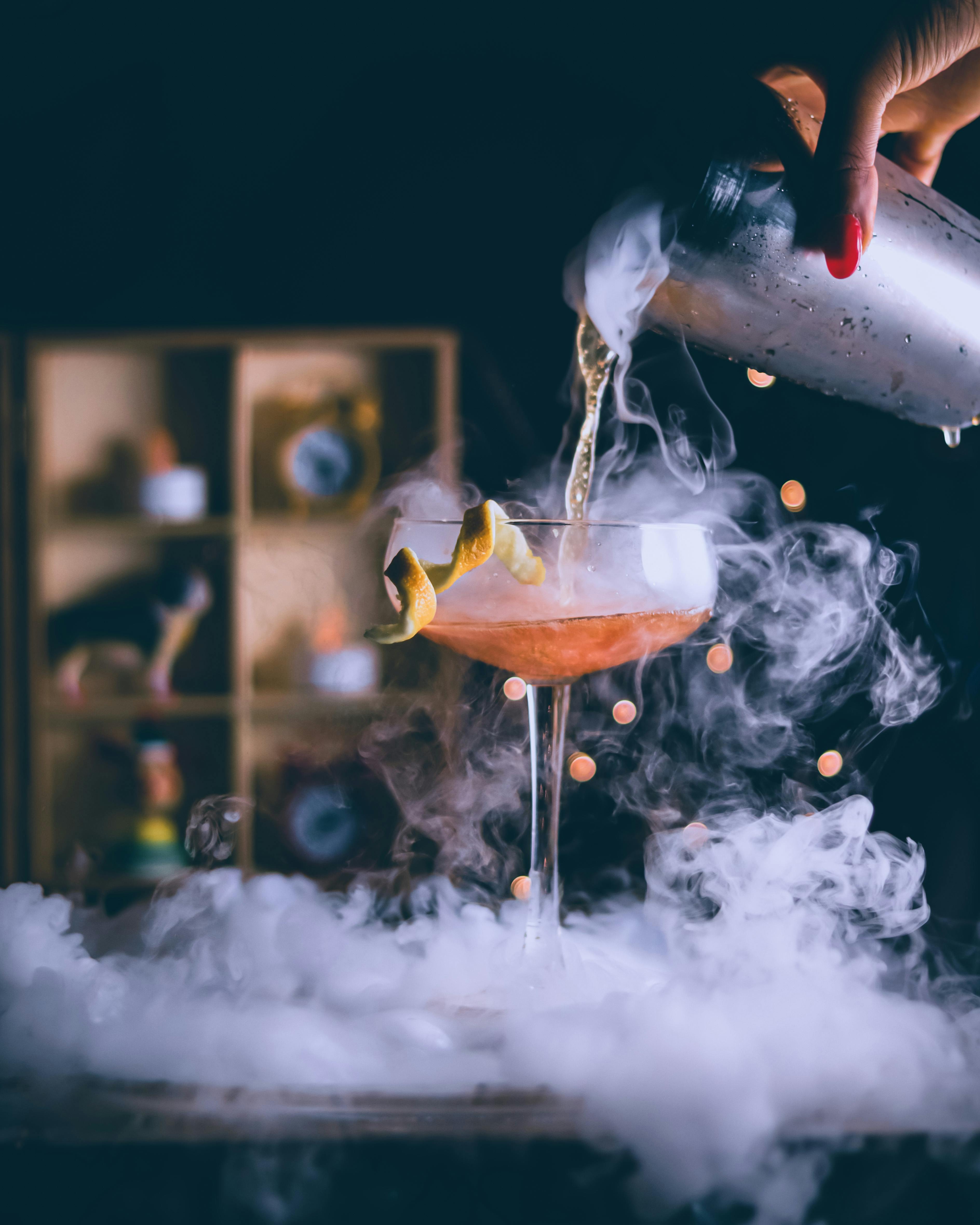 Person Preparing Rum Drink · Free Stock Photo