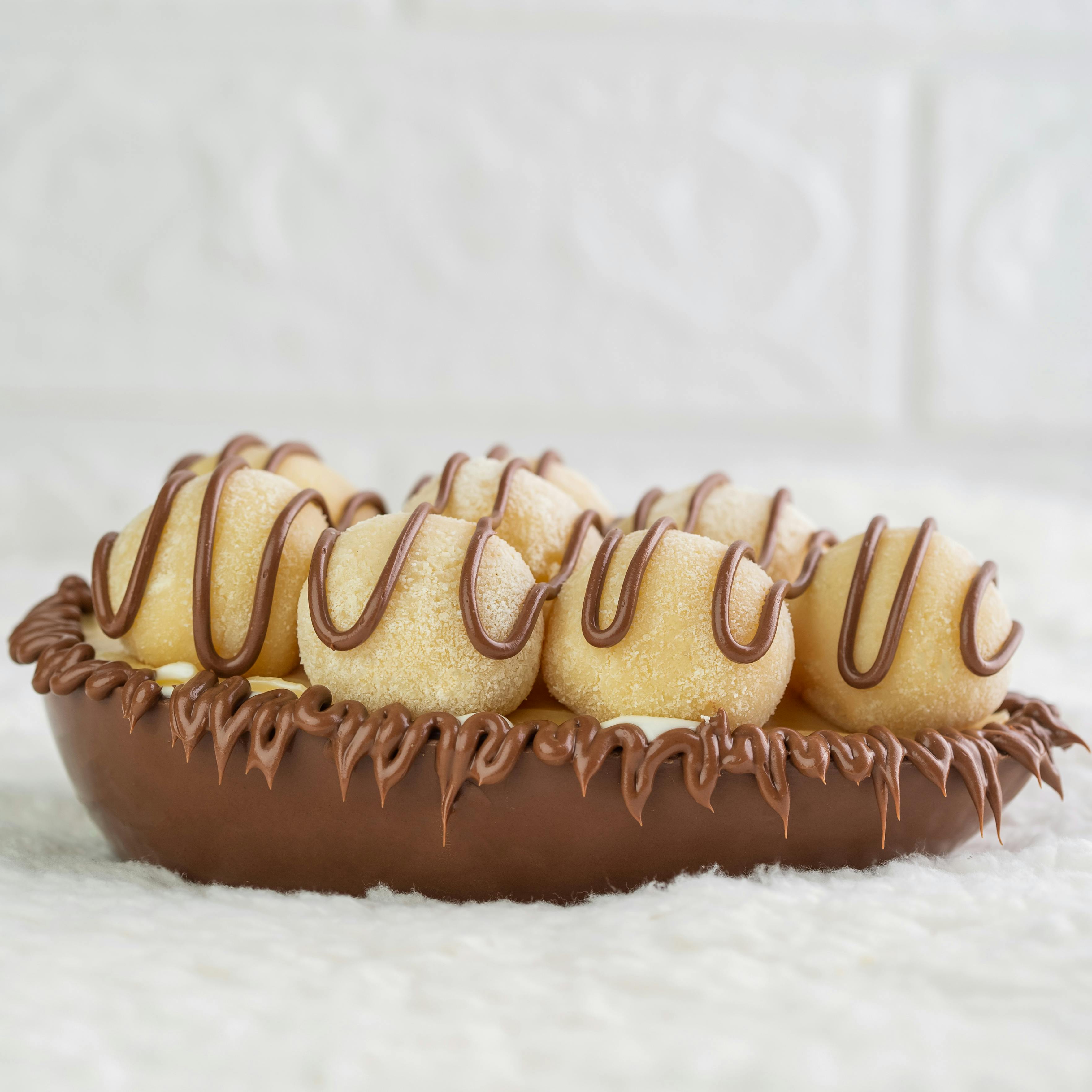Chocolate and Vanilla Round Pastry · Free Stock Photo