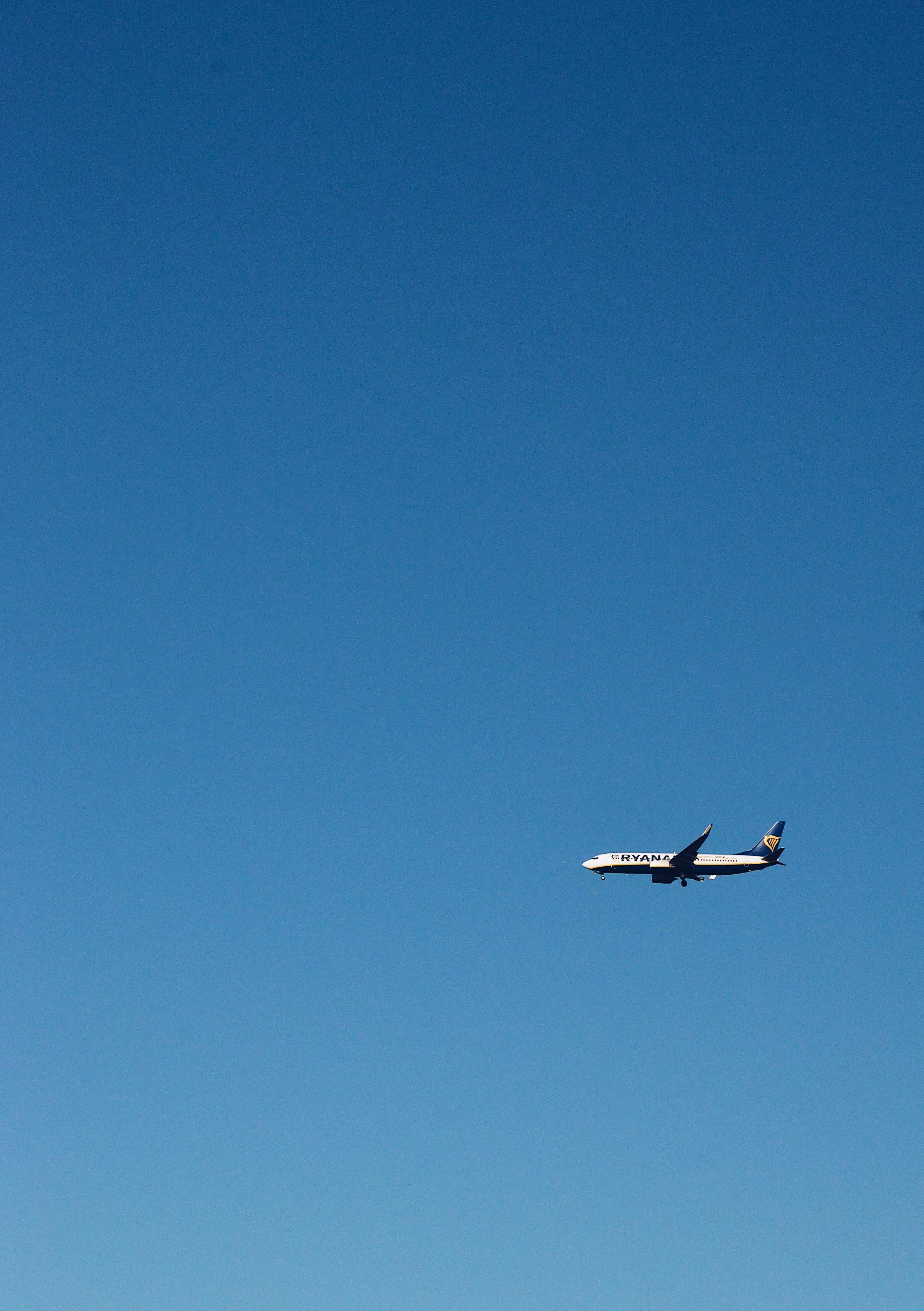 Flying Airplane on Clear Sky · Free Stock Photo