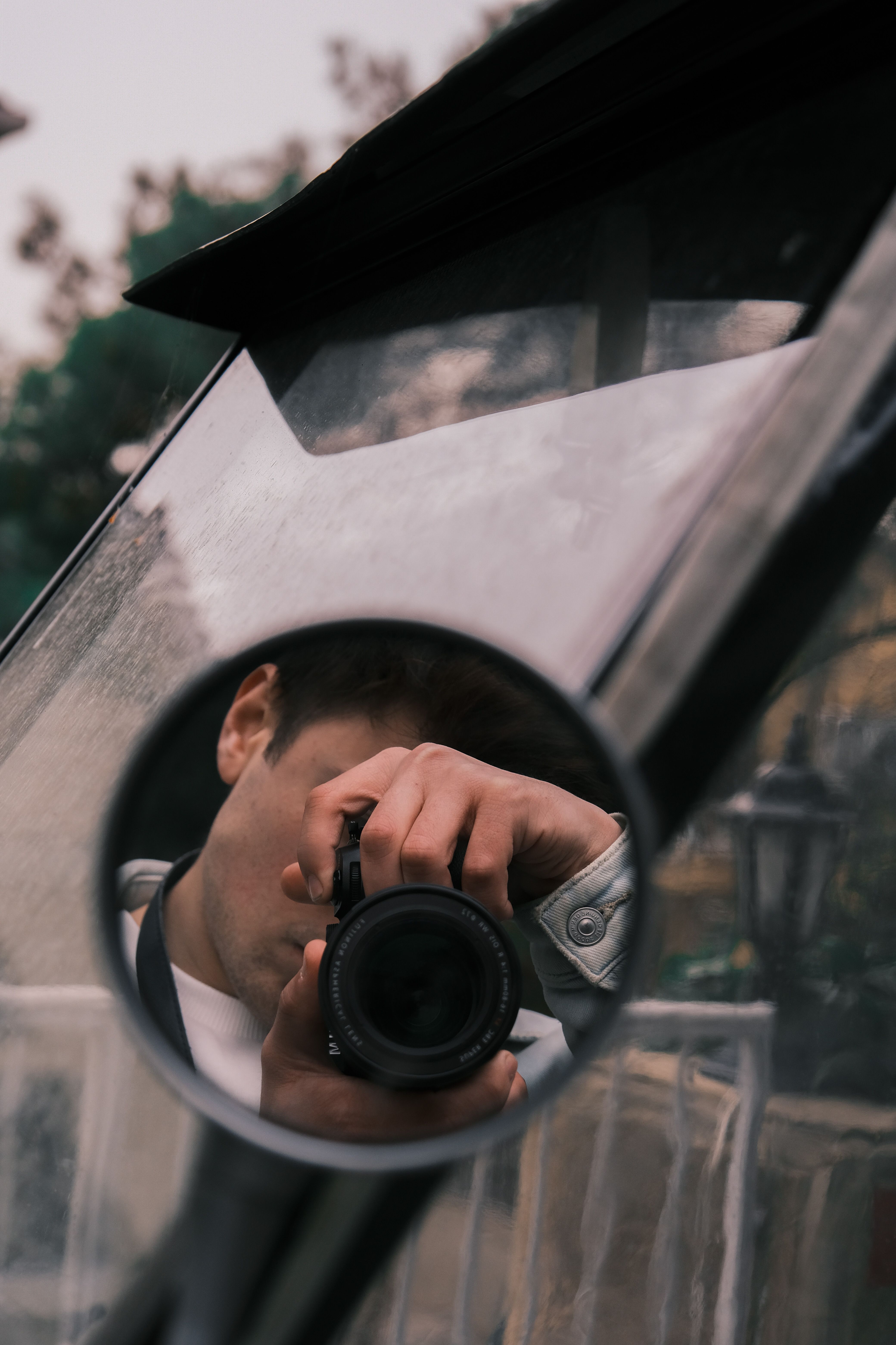 Man Taking Picture with Camera in Mirror · Free Stock Photo