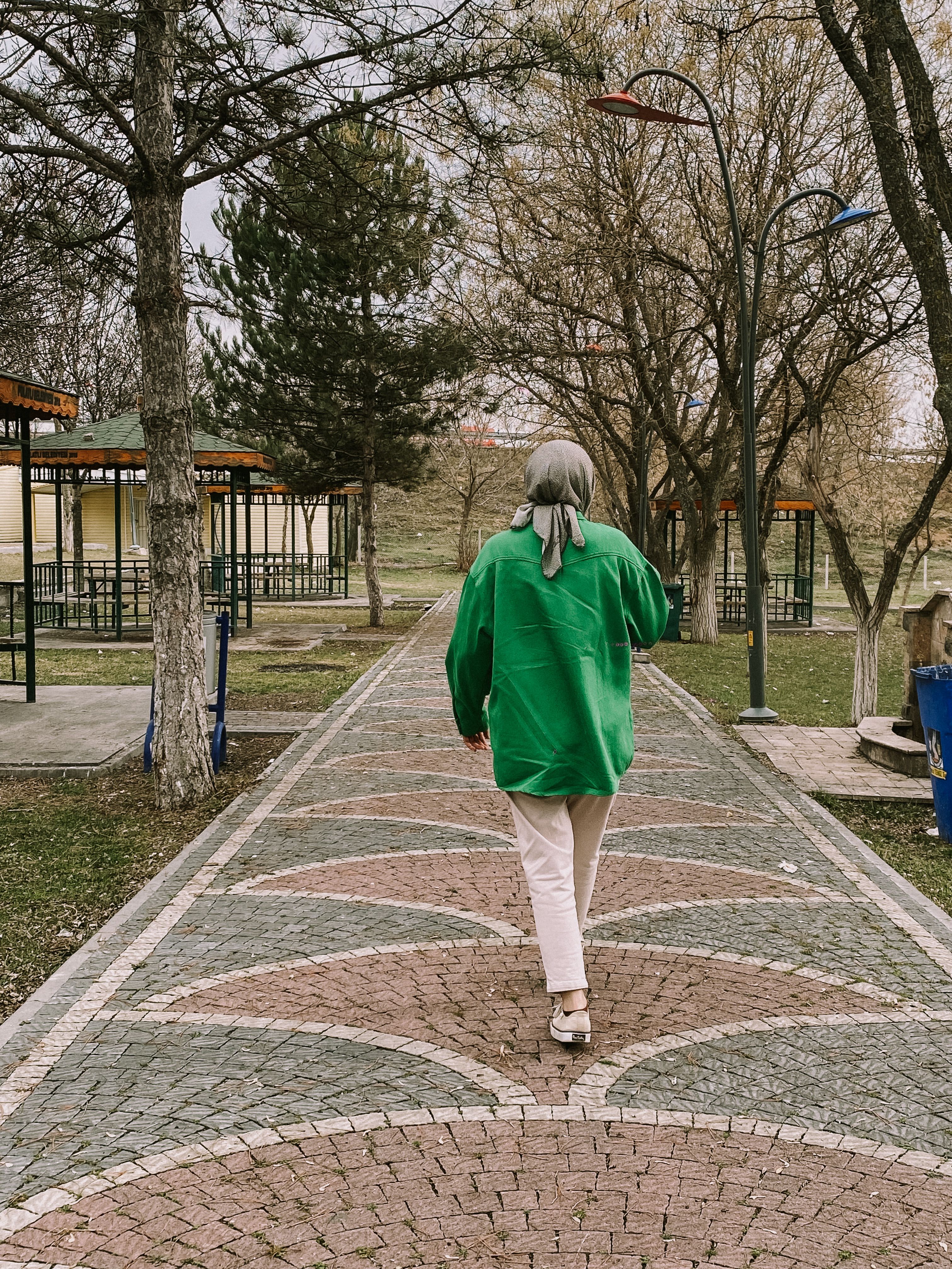 Woman Walking on Walkway · Free Stock Photo