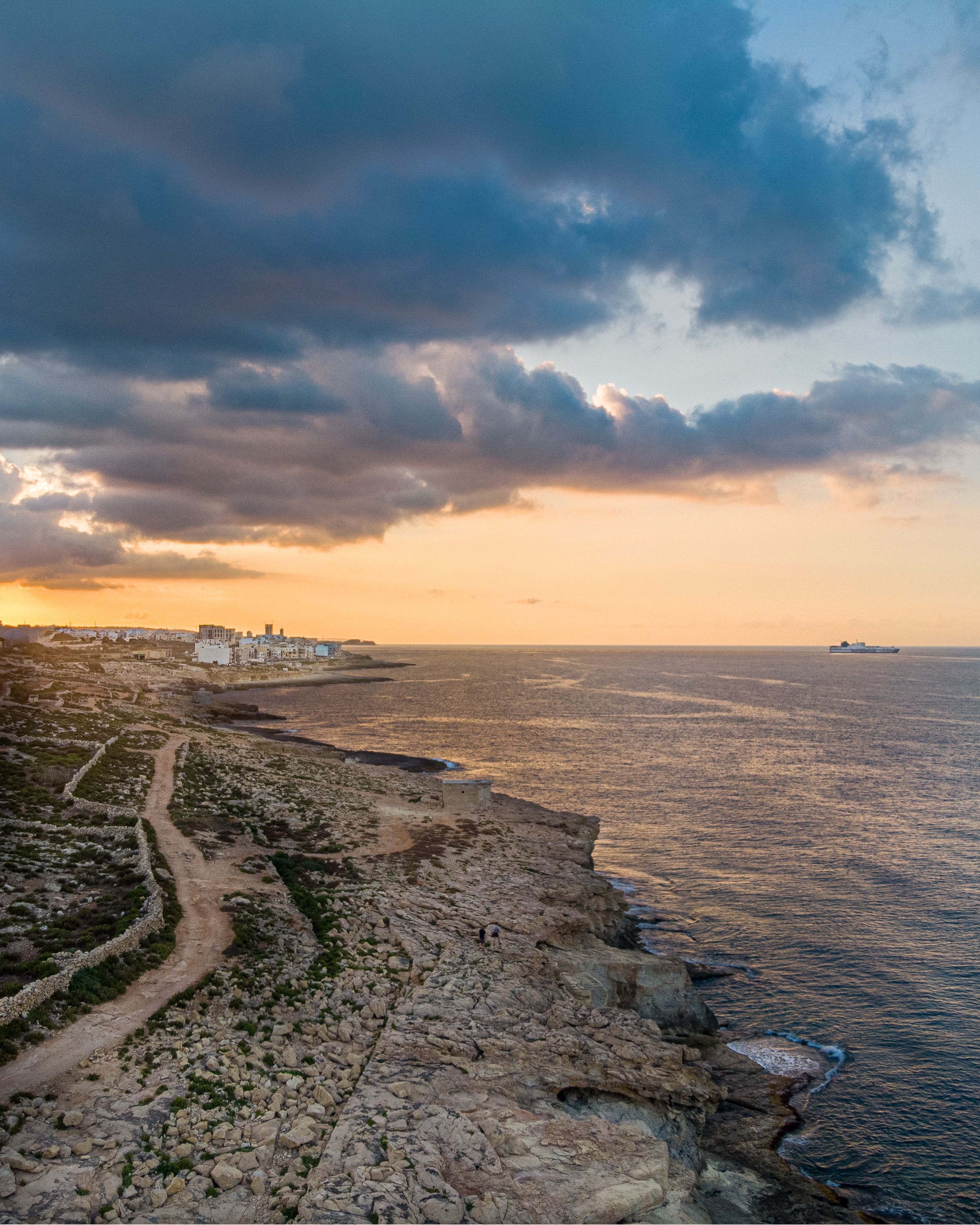 Rain Cloud over Sea Coast at Sunset · Free Stock Photo
