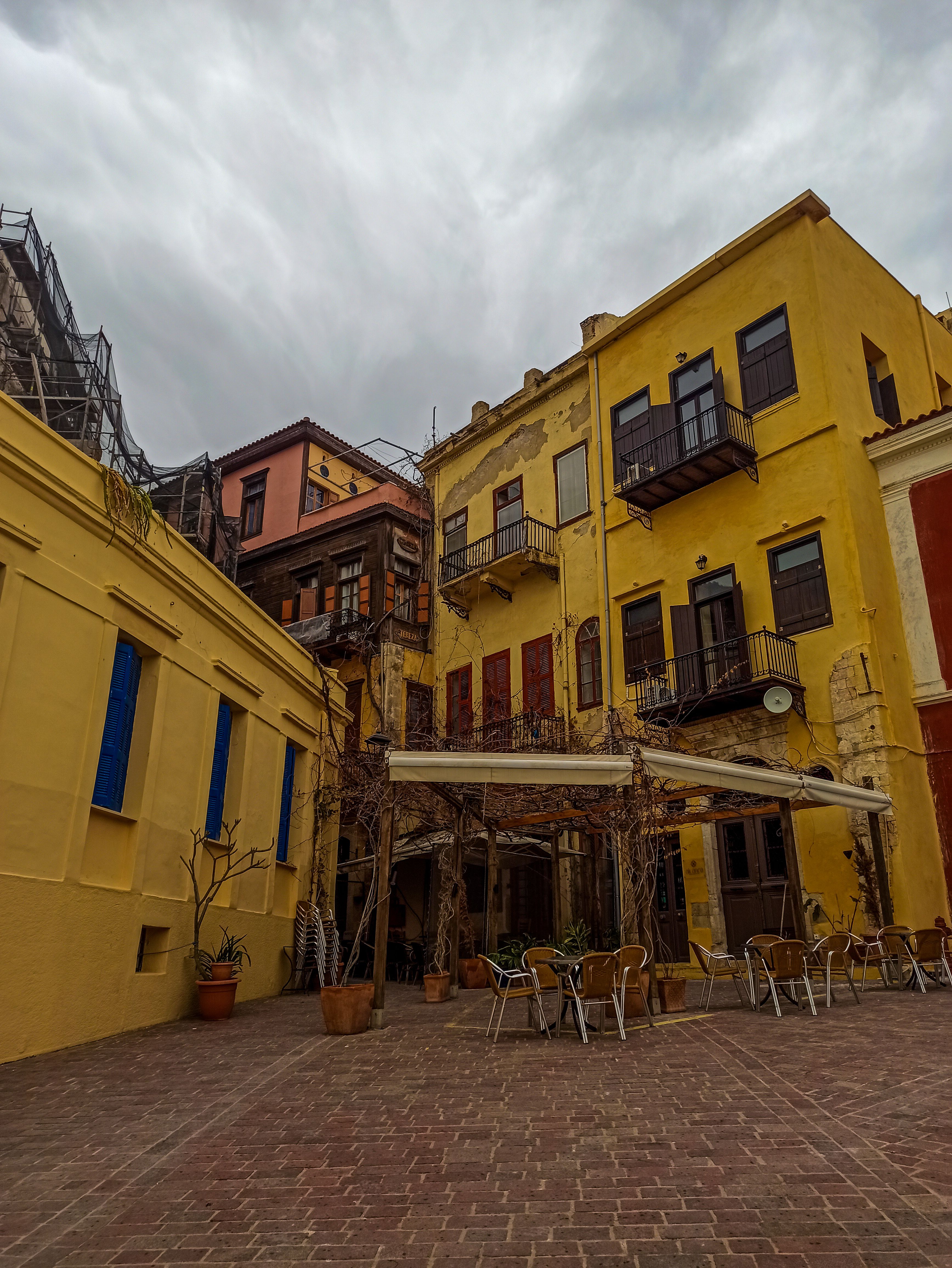 Yellow Buildings in Alley in Town · Free Stock Photo