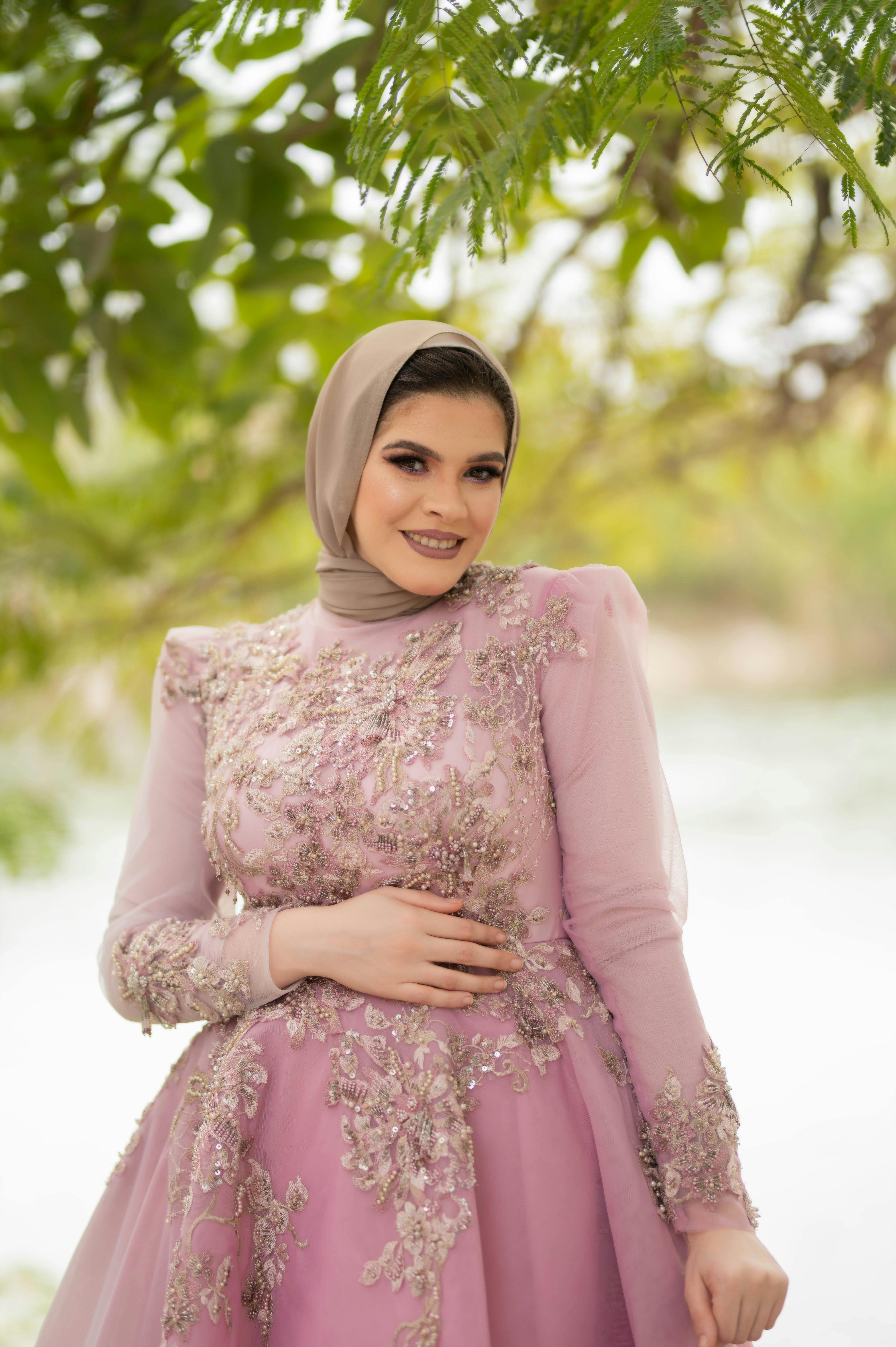 Woman in Shawl Posing with Balloons · Free Stock Photo