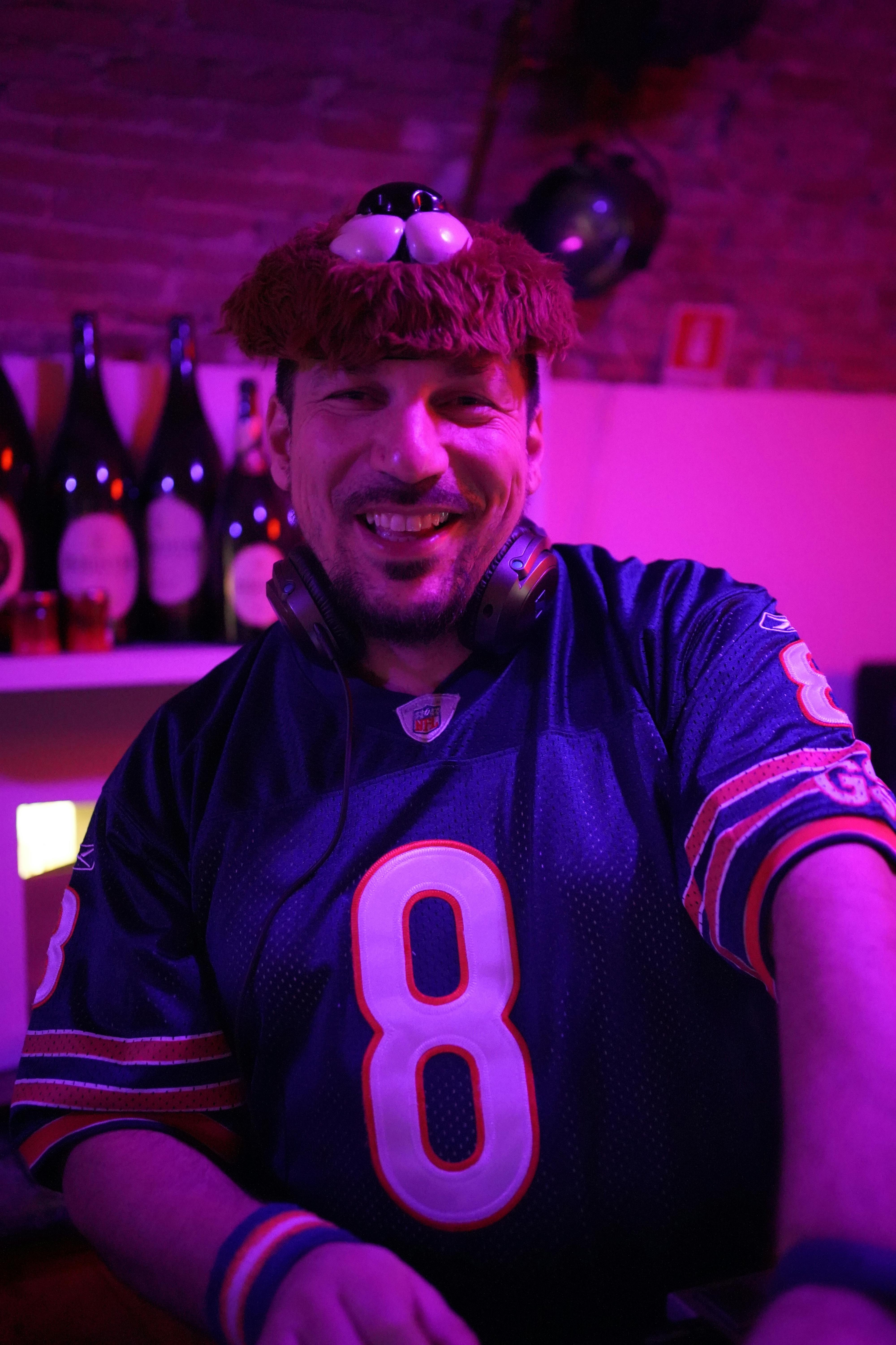 Smiling Man Wearing Mask on Forehead · Free Stock Photo