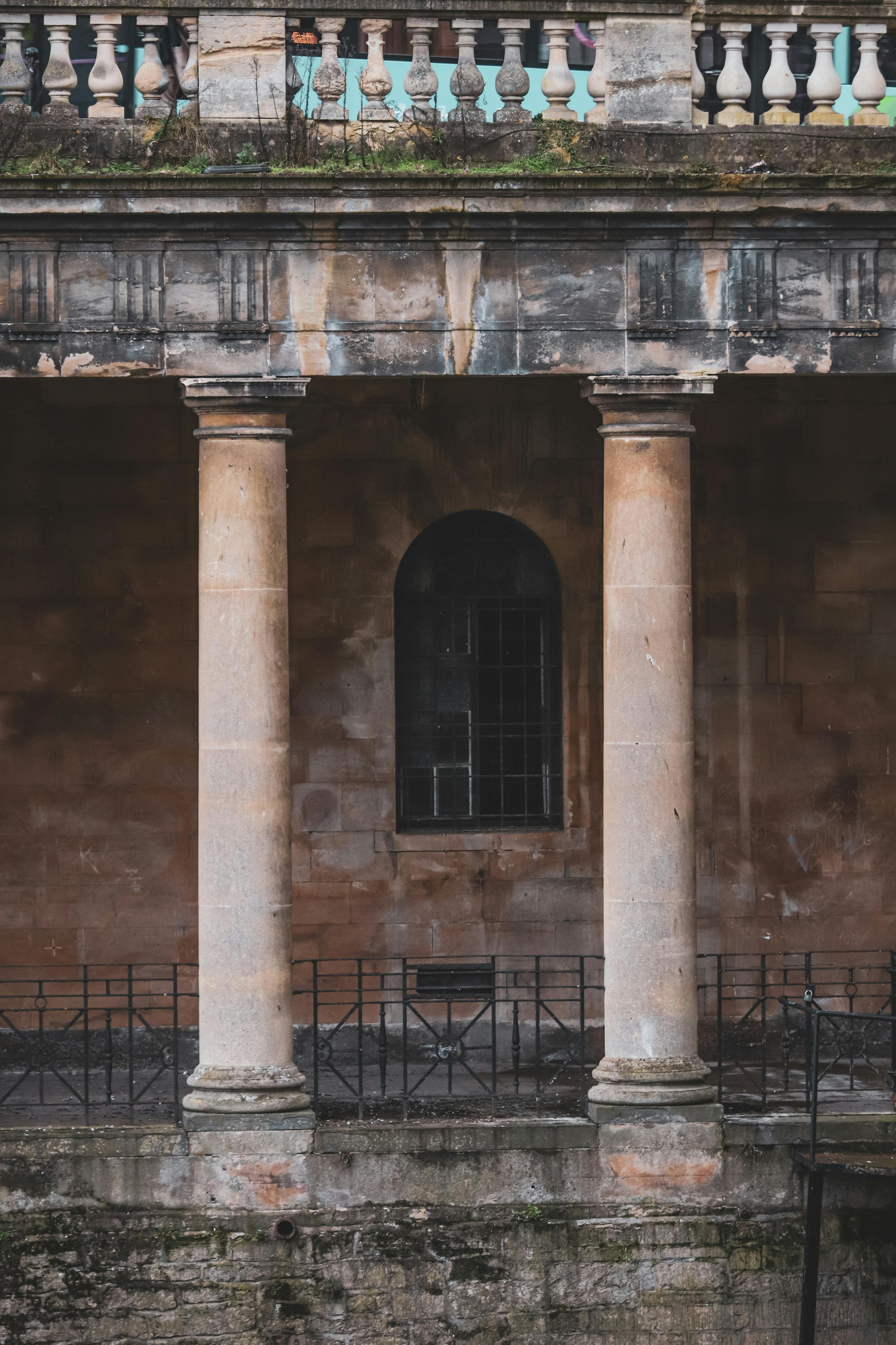 Dirty Column with Ornaments · Free Stock Photo