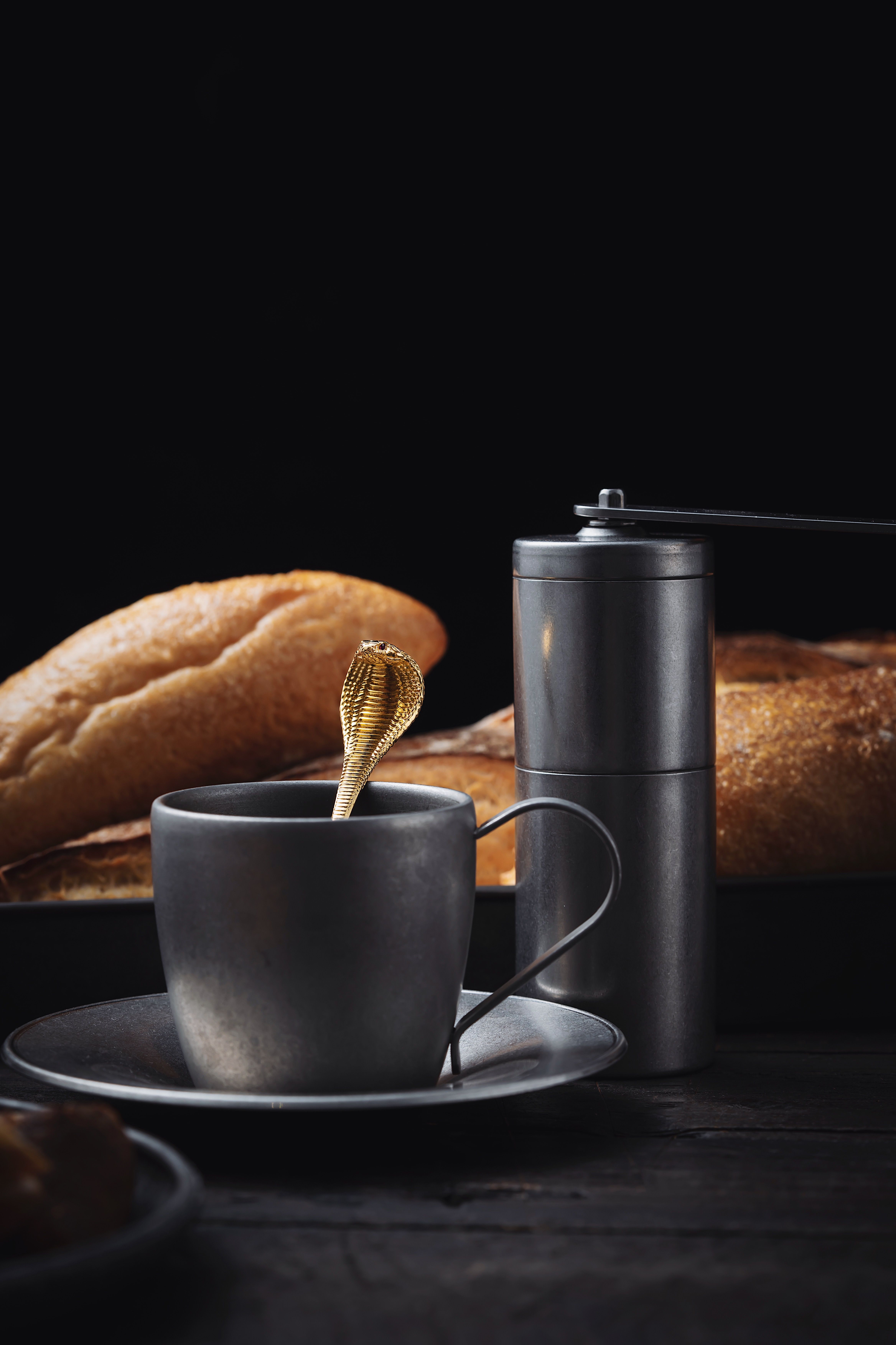 Spoon with Golden Snake in Coffee Cup · Free Stock Photo