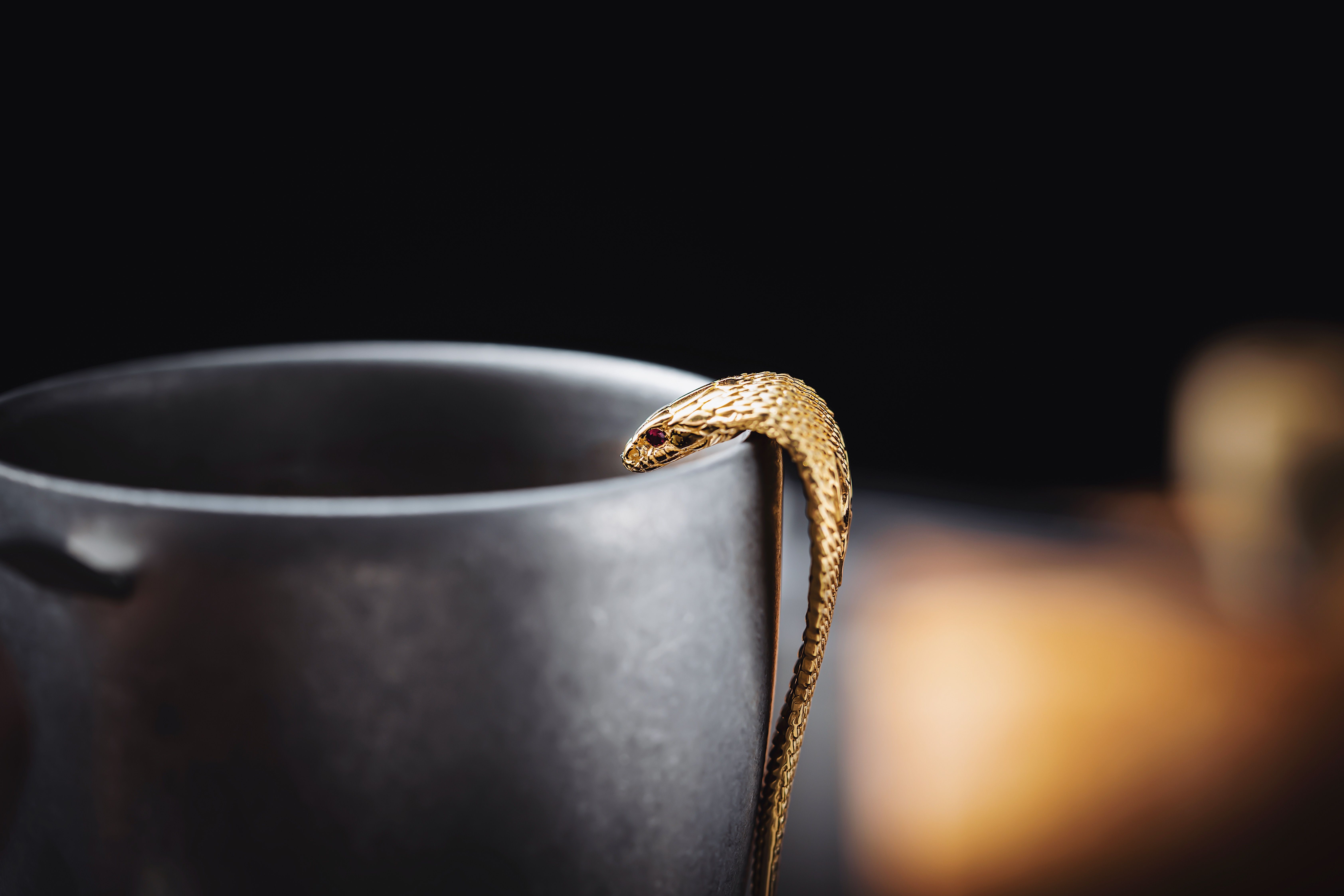 Cup and Golden Cobra Spoon · Free Stock Photo