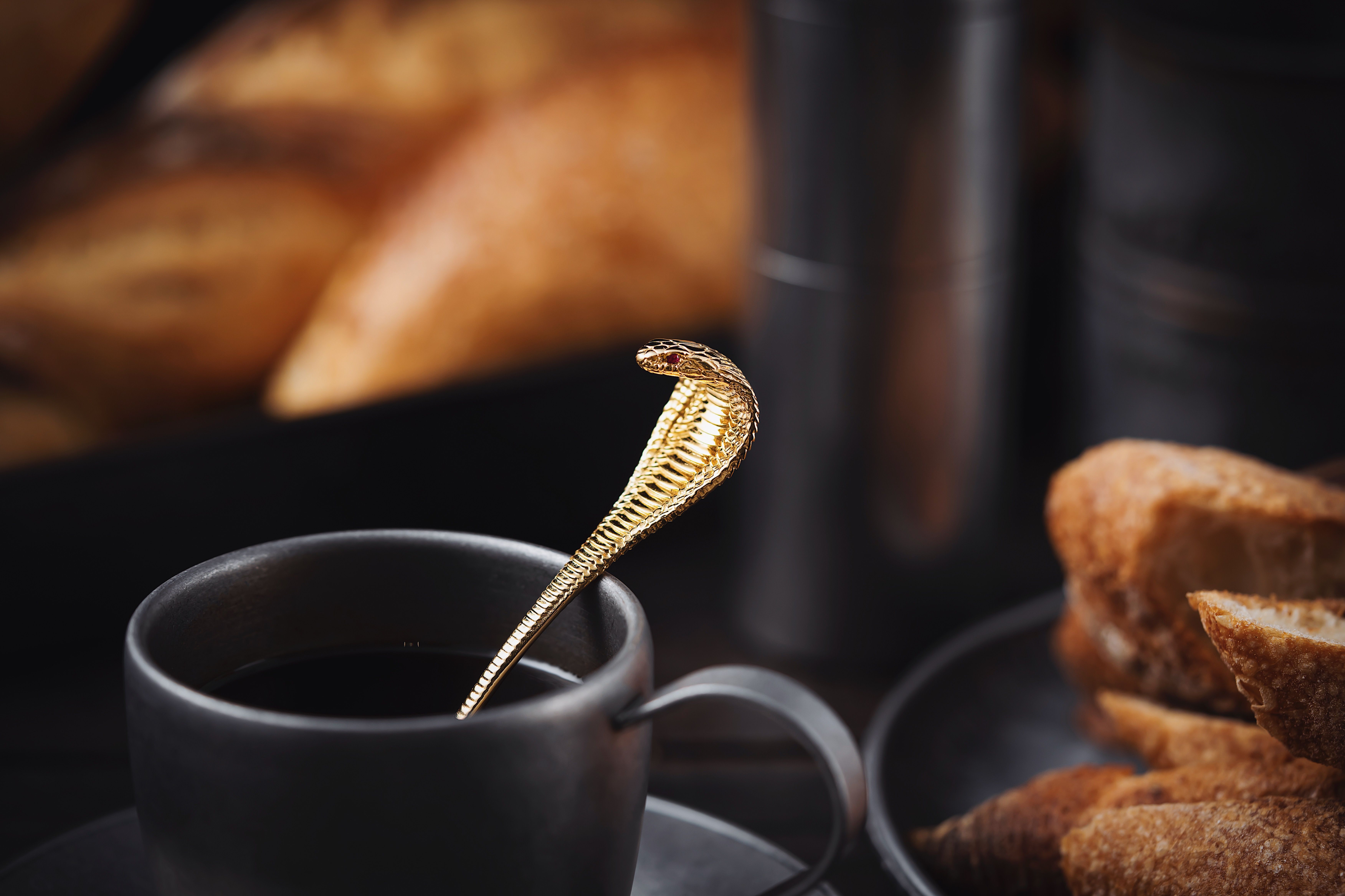 Golden Cobra Spoon in Cup · Free Stock Photo