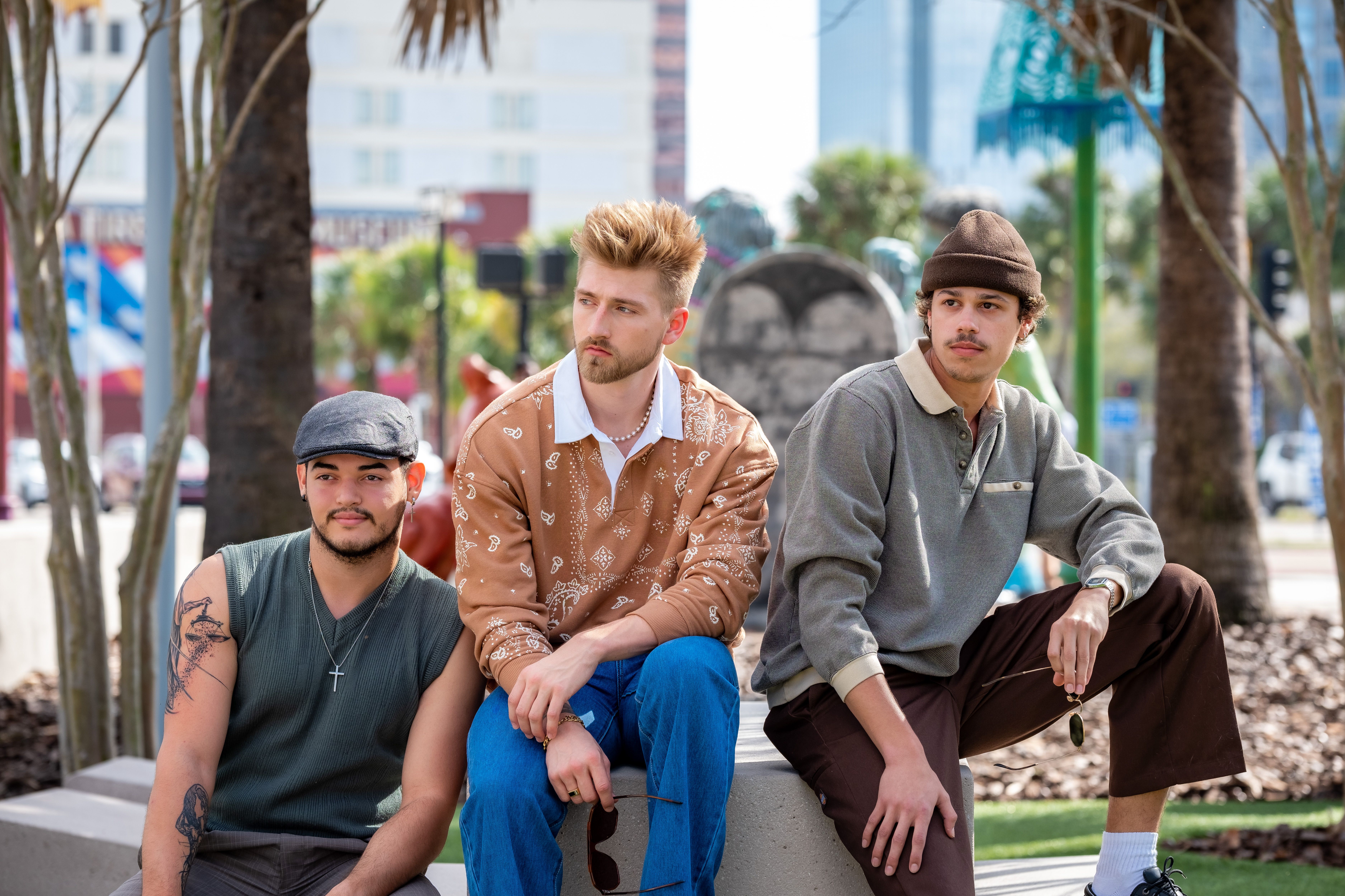 A Group of Young Men in Trendy Outfits · Free Stock Photo