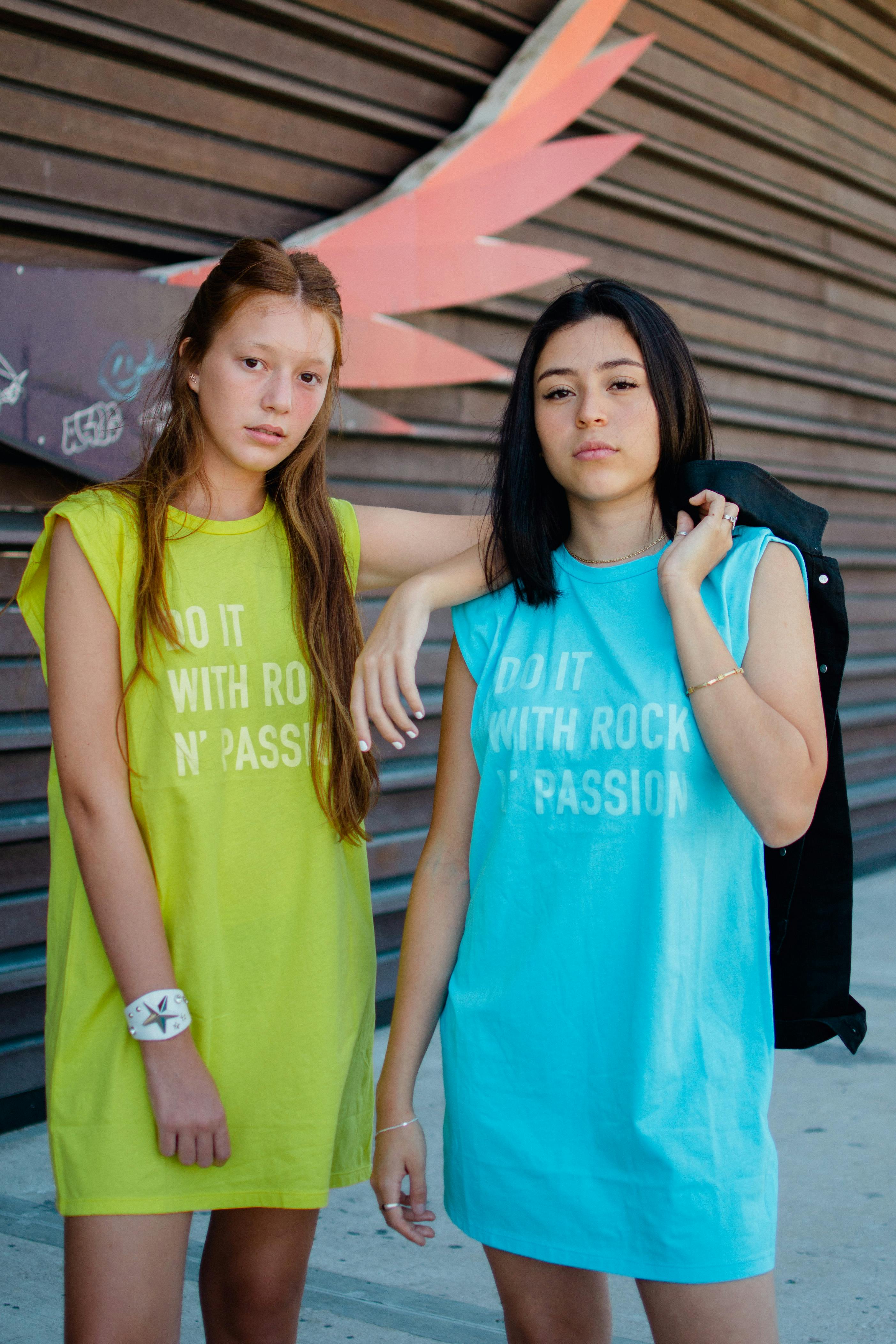 Smiling Girls in Mini Dresses on Beach · Free Stock Photo