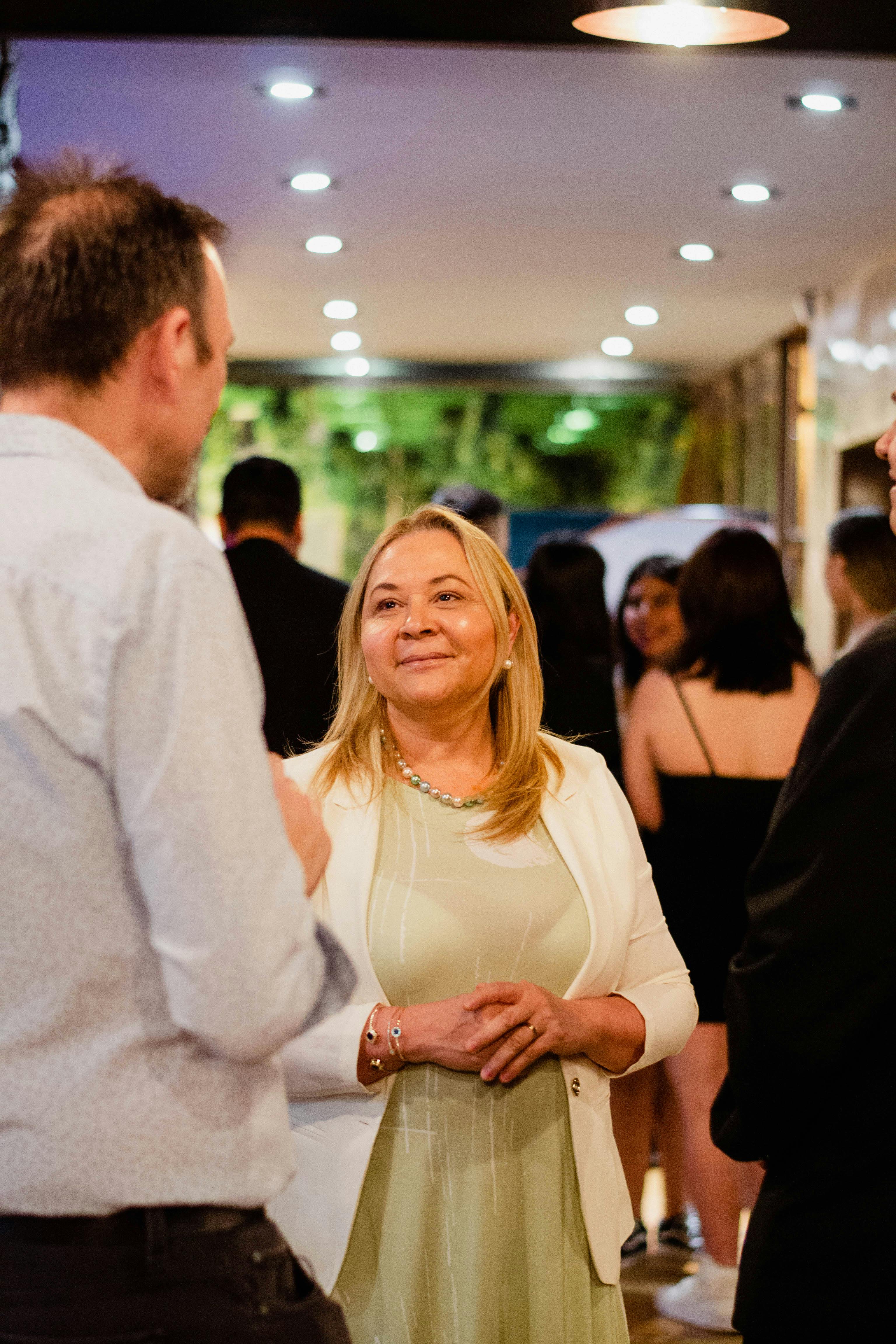 People Talking at Event · Free Stock Photo